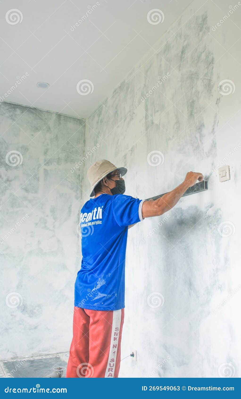 Construction Worker Outlining the Wall Editorial Stock Photo - Image of ...