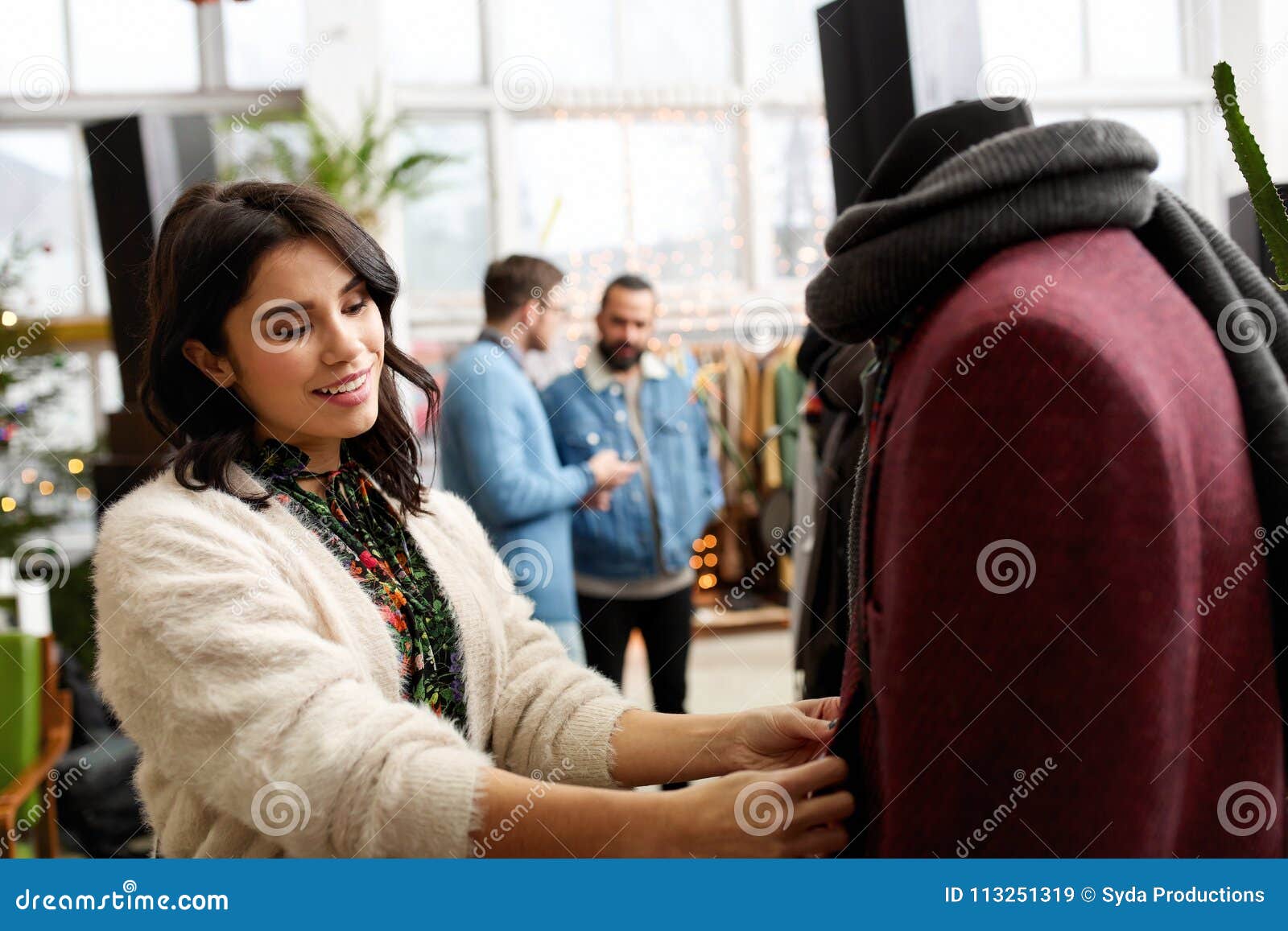 Happy Woman Choosing Clothes at Clothing Store Stock Image - Image of ... Happy Woman Choosing Clothes at Clothing Store Stock Image - Image of ...
