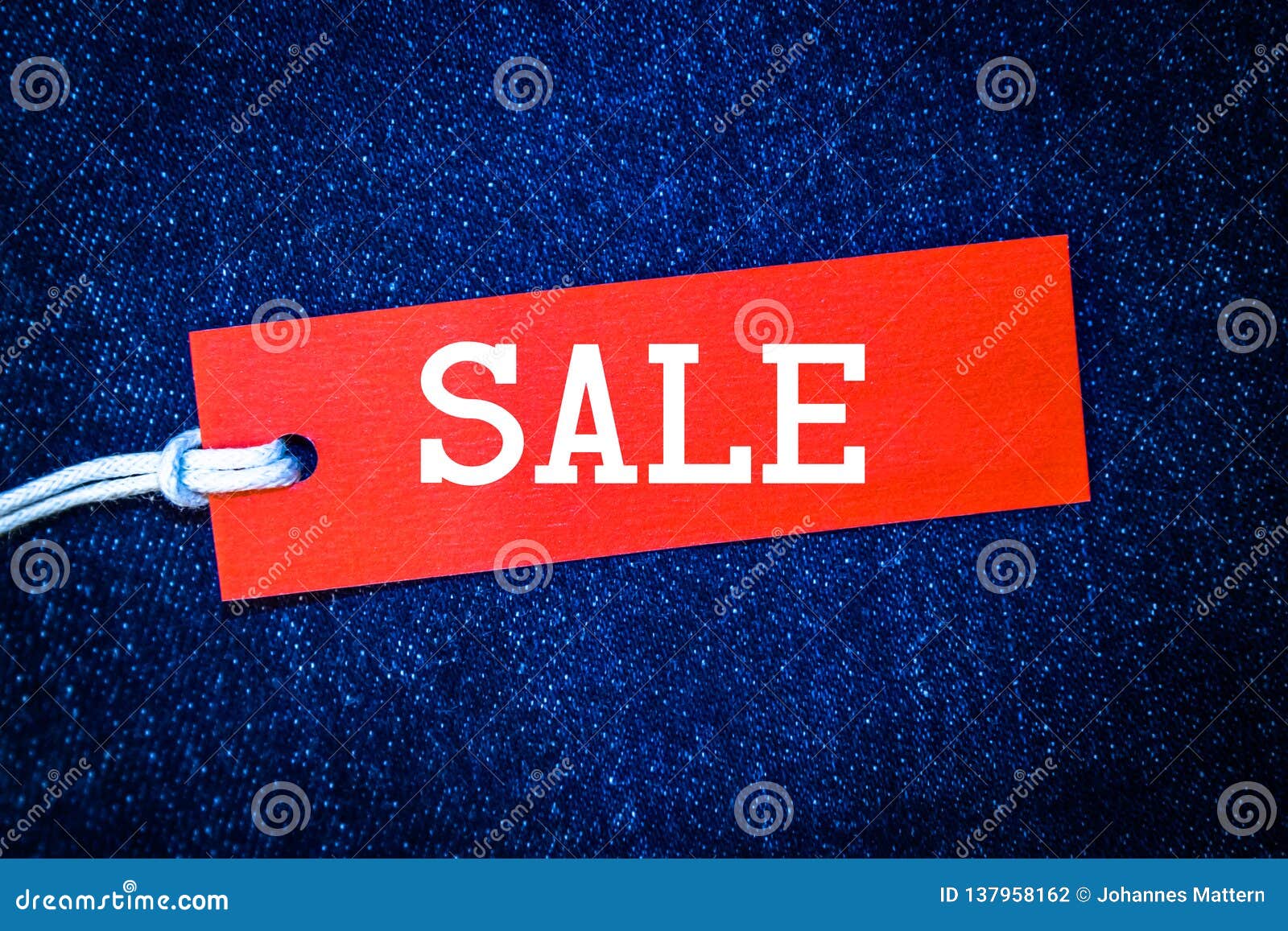 Sale Tag on Jeans stock photo. Image of attached, pricing - 137958162