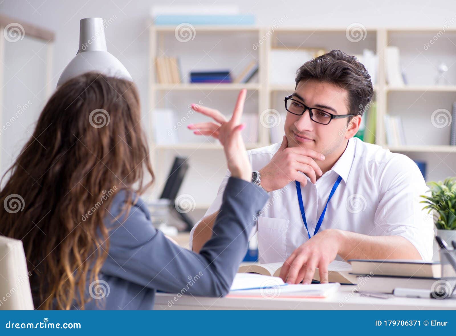 Sales Assistant Discussing Transaction with Customer Stock Image ...