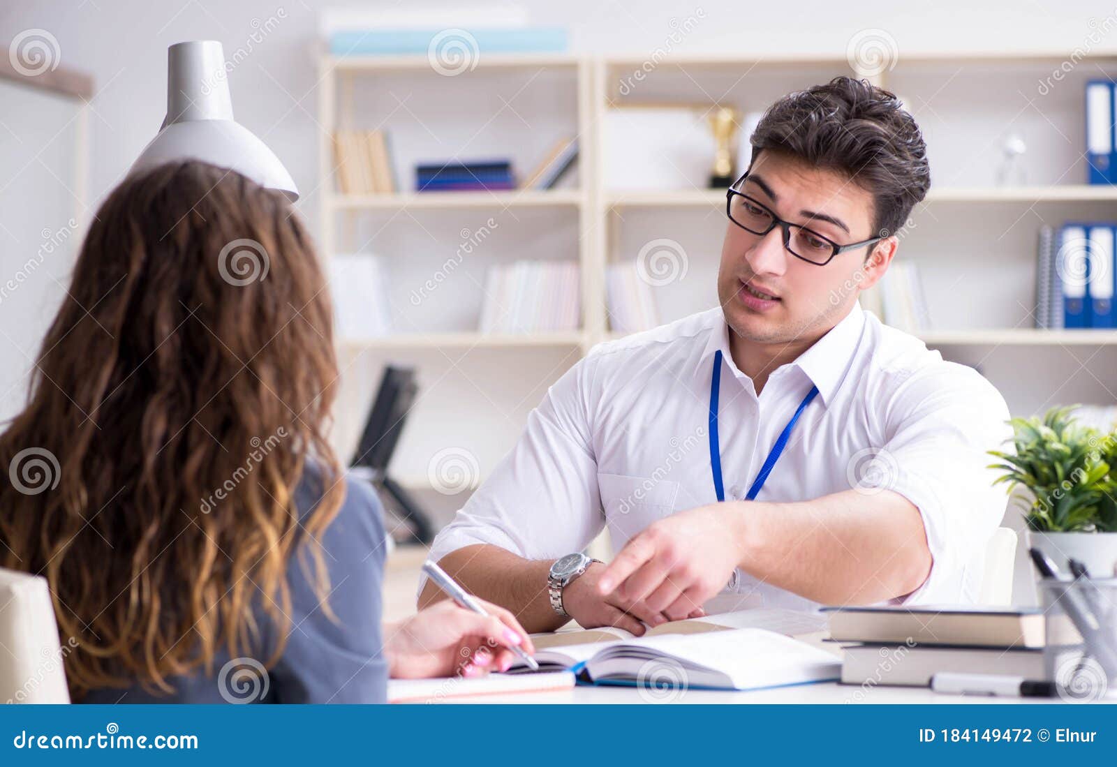 Sales Assistant Discussing Transaction with Customer Stock Photo ...