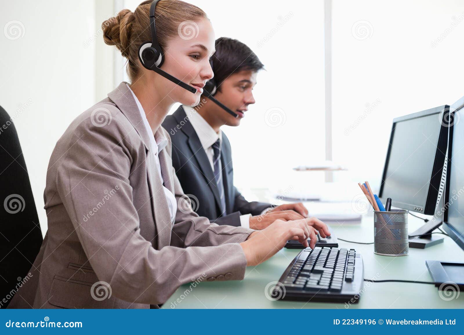 Sales Assistants Working with Computers Stock Photo - Image of business ...