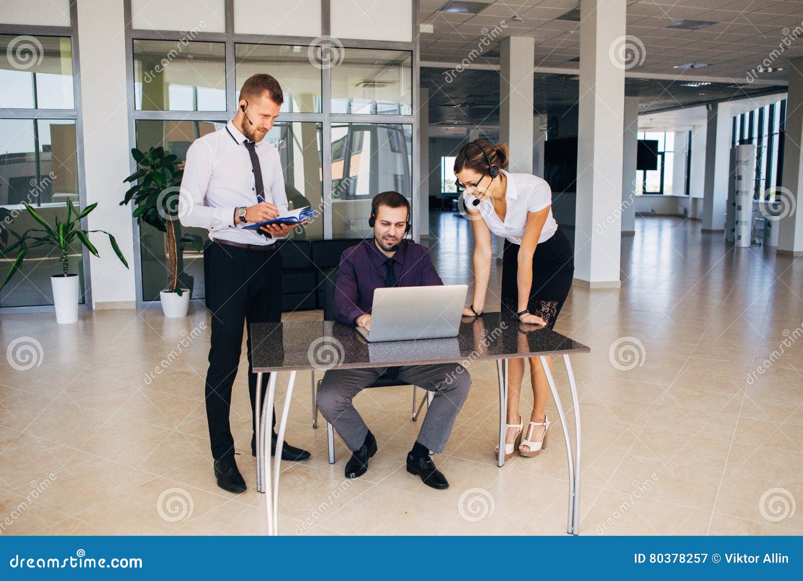 Sales Assistants Working with Computers in an Office Stock Image ...