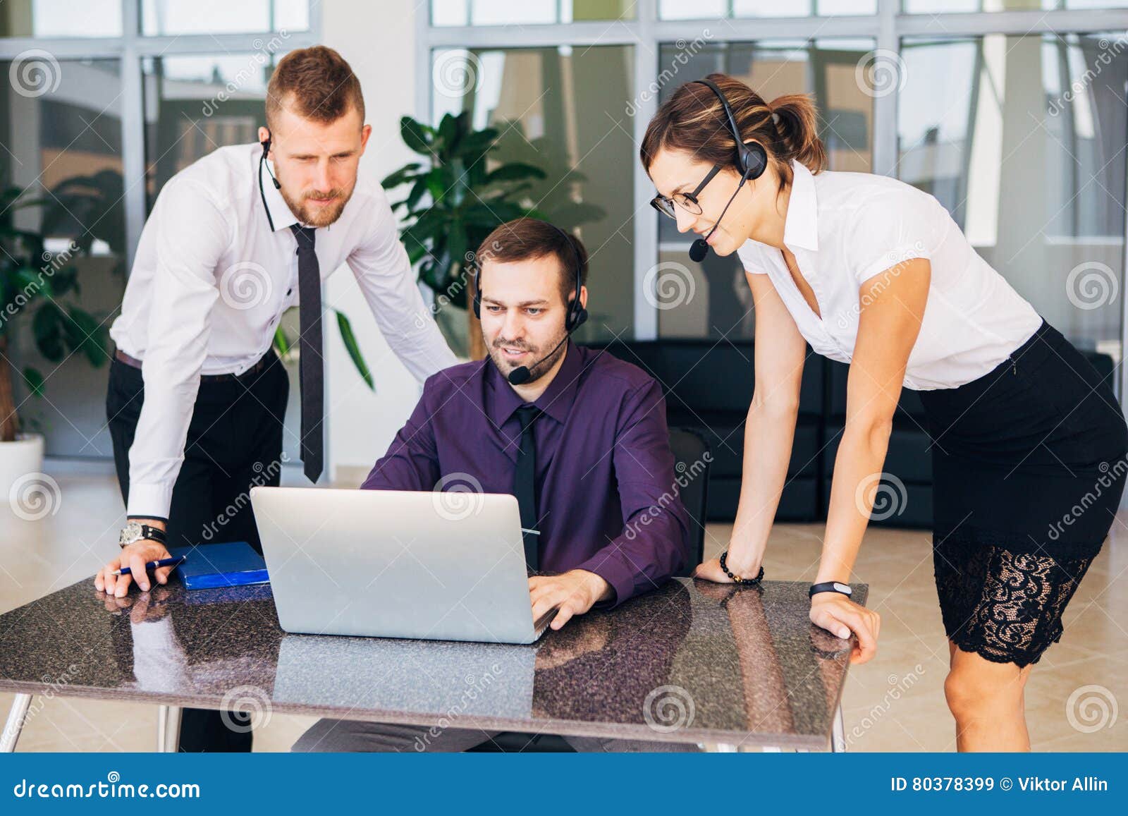 Sales Assistants Working with Computers in an Office Stock Image ...