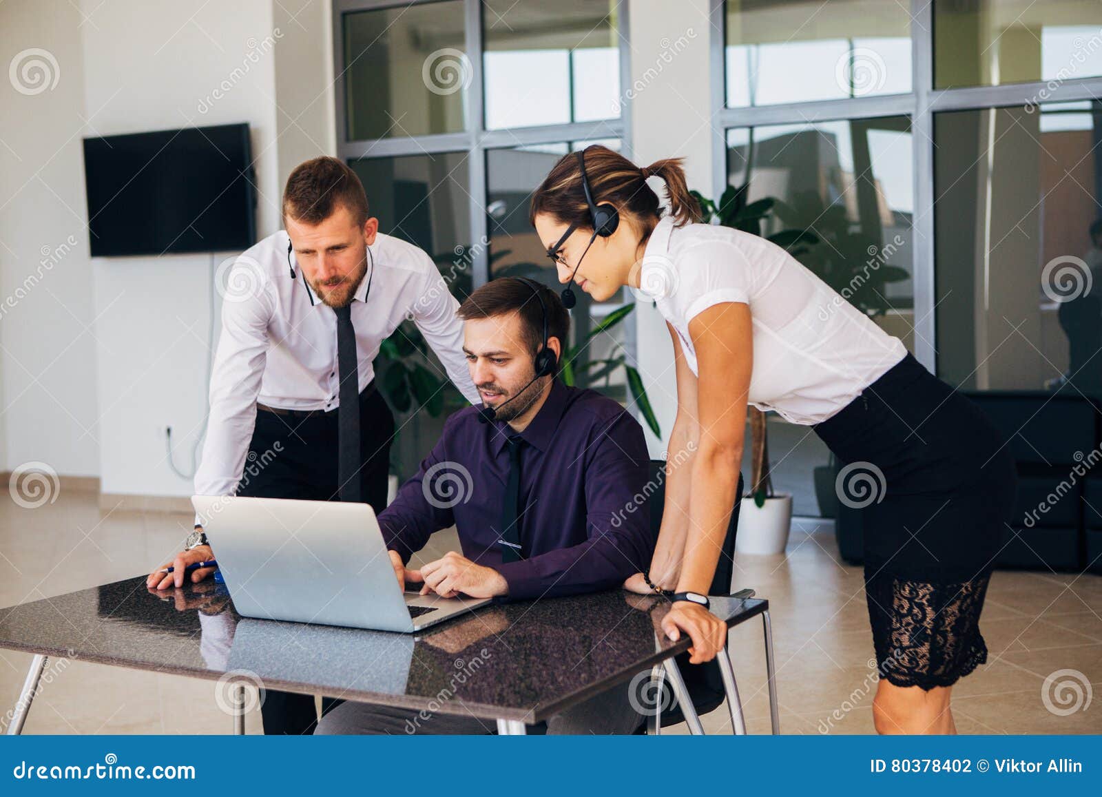 Sales Assistants Working with Computers in an Office Stock Photo ...