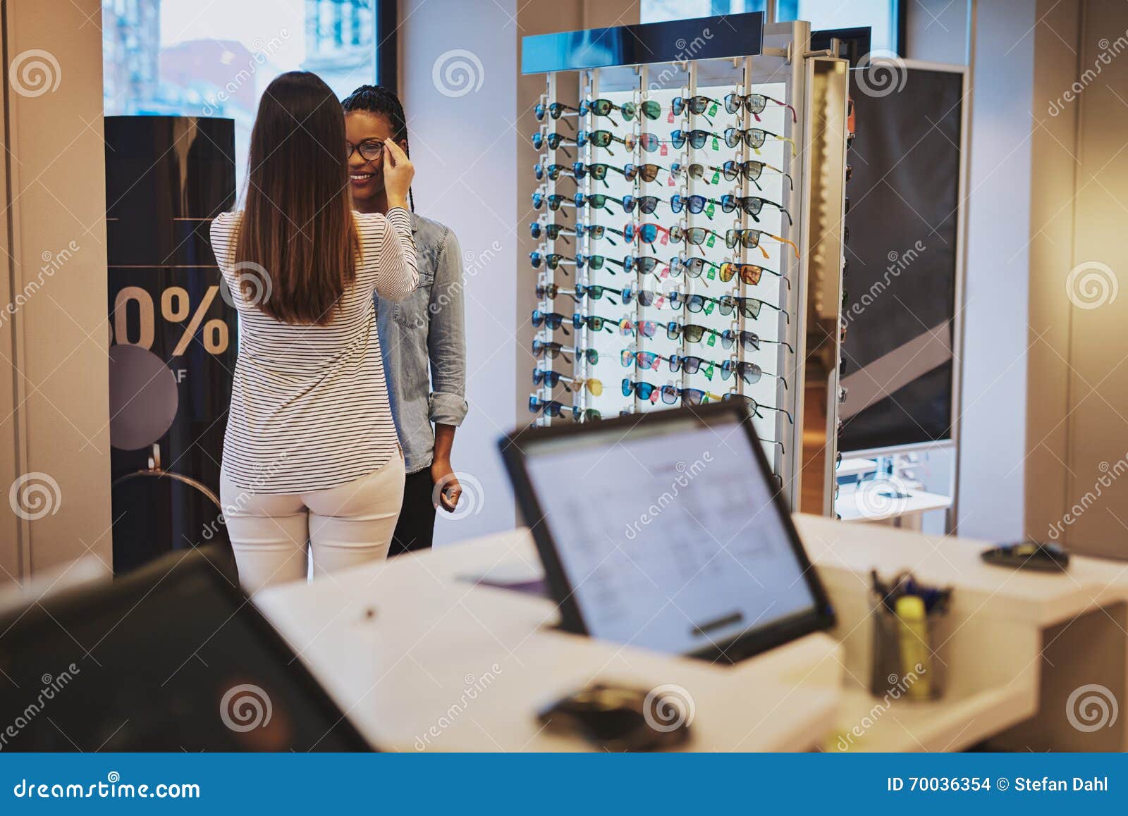 Sales Lady Assisting a Customer in a Store Stock Photo - Image of ...