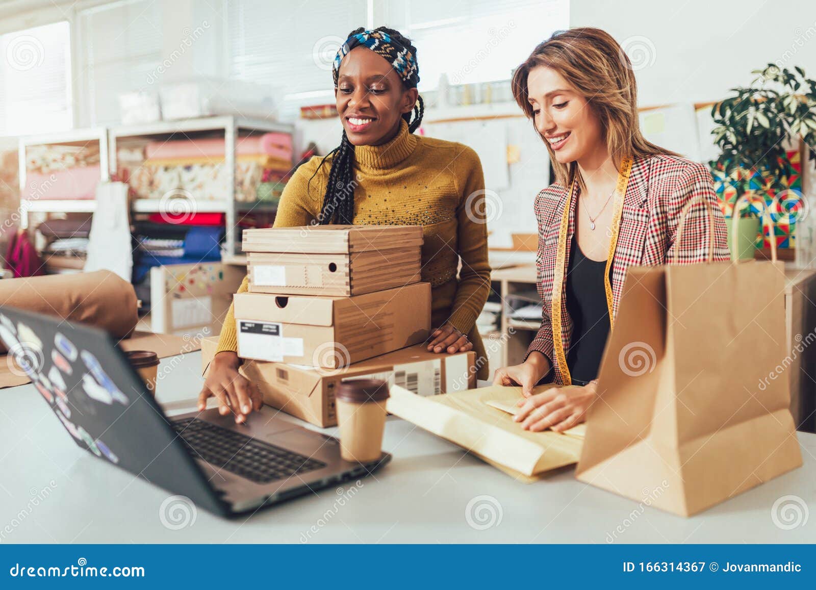 Working Women at Their Store. they Accepting New Orders Online and ...