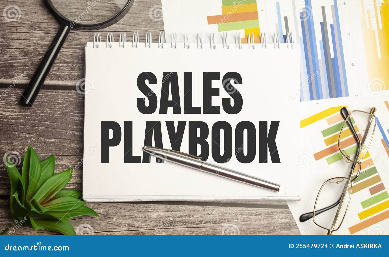 Sales Playbook Words on Notepad with Magnifying Glass and Charts Stock ...