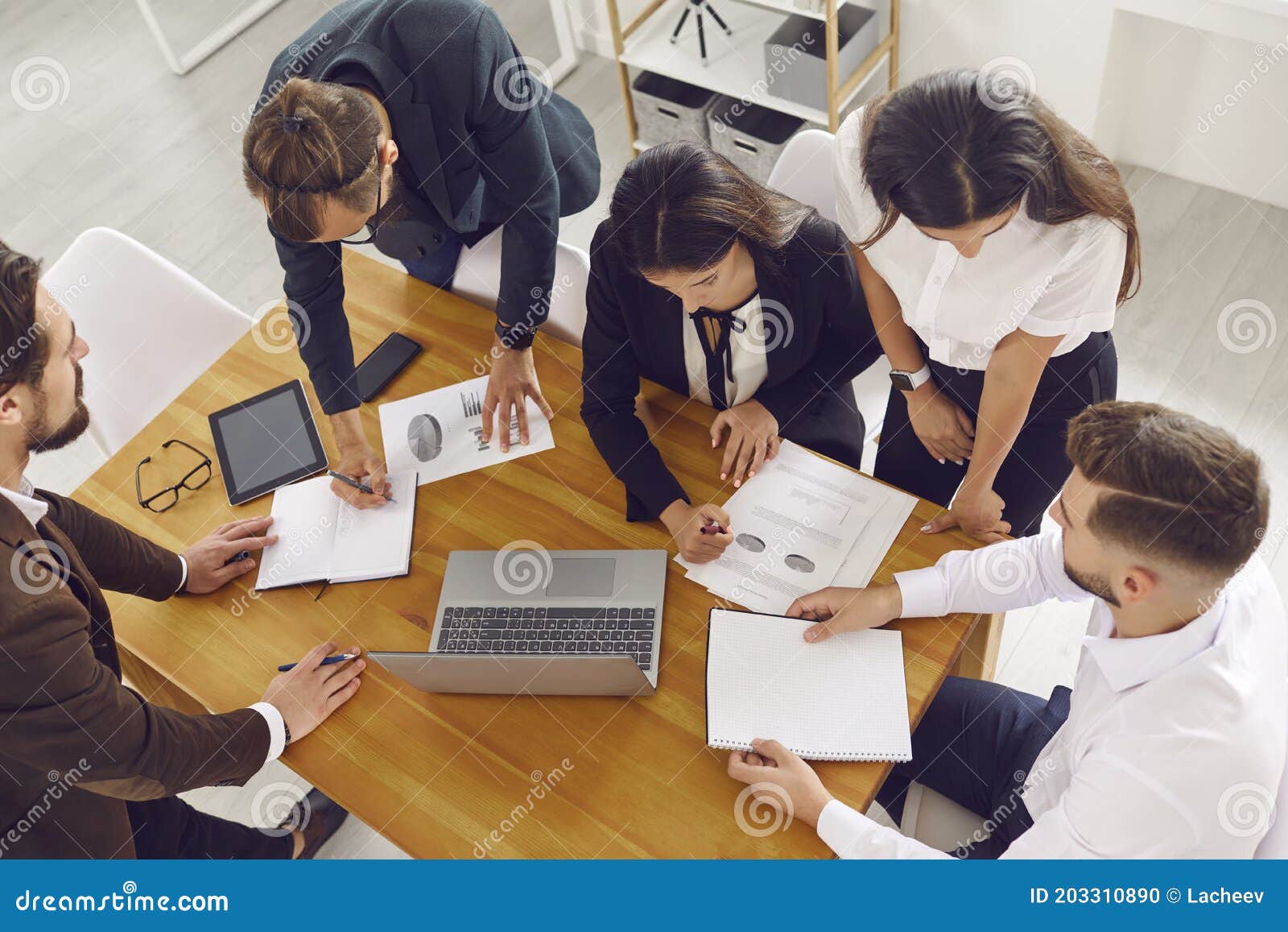 Sales Team Gather Around Office Desk, Analyze Financial Data and Do ...