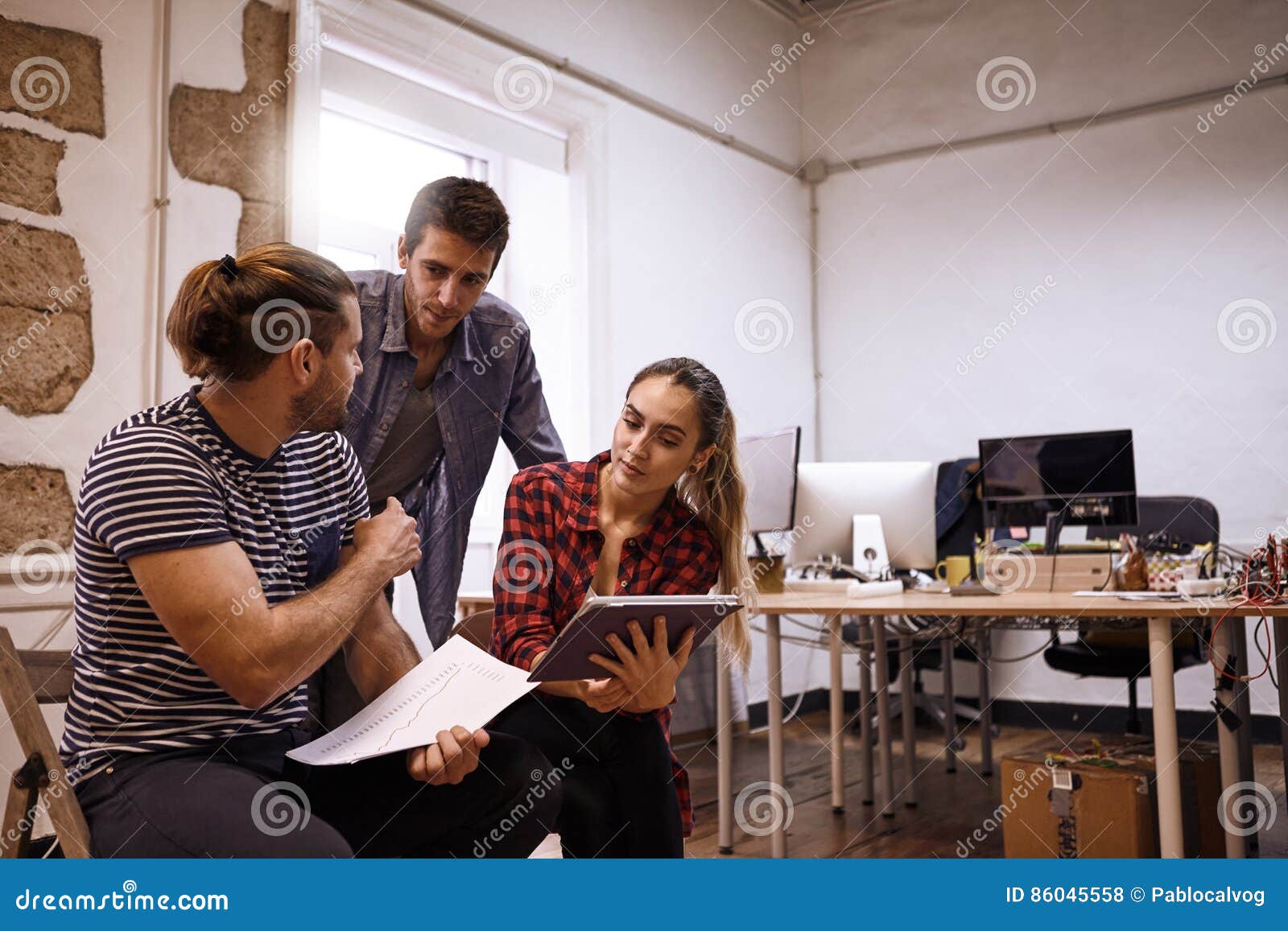 Sales Team of Three Young Representatives Stock Photo - Image of ...