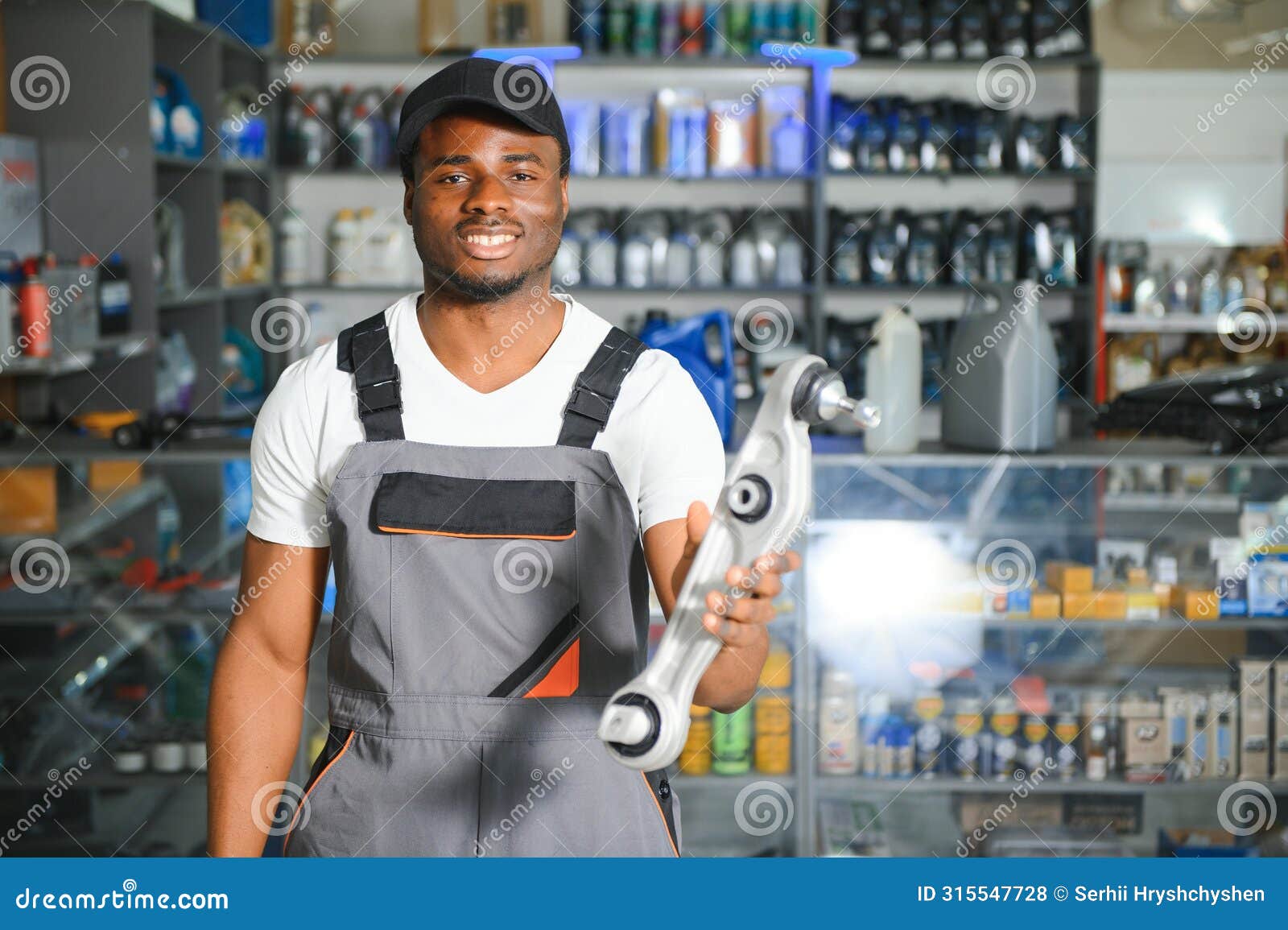 A Salesman in an Auto Parts Store Stock Photo - Image of diagnostic ...