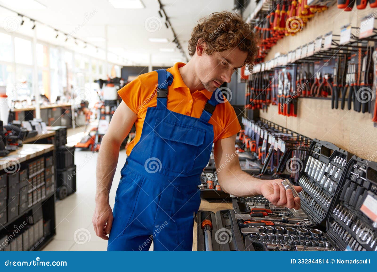 Salesman Checking Socket Wrenches in Tool Box at Hardware Store Stock ...