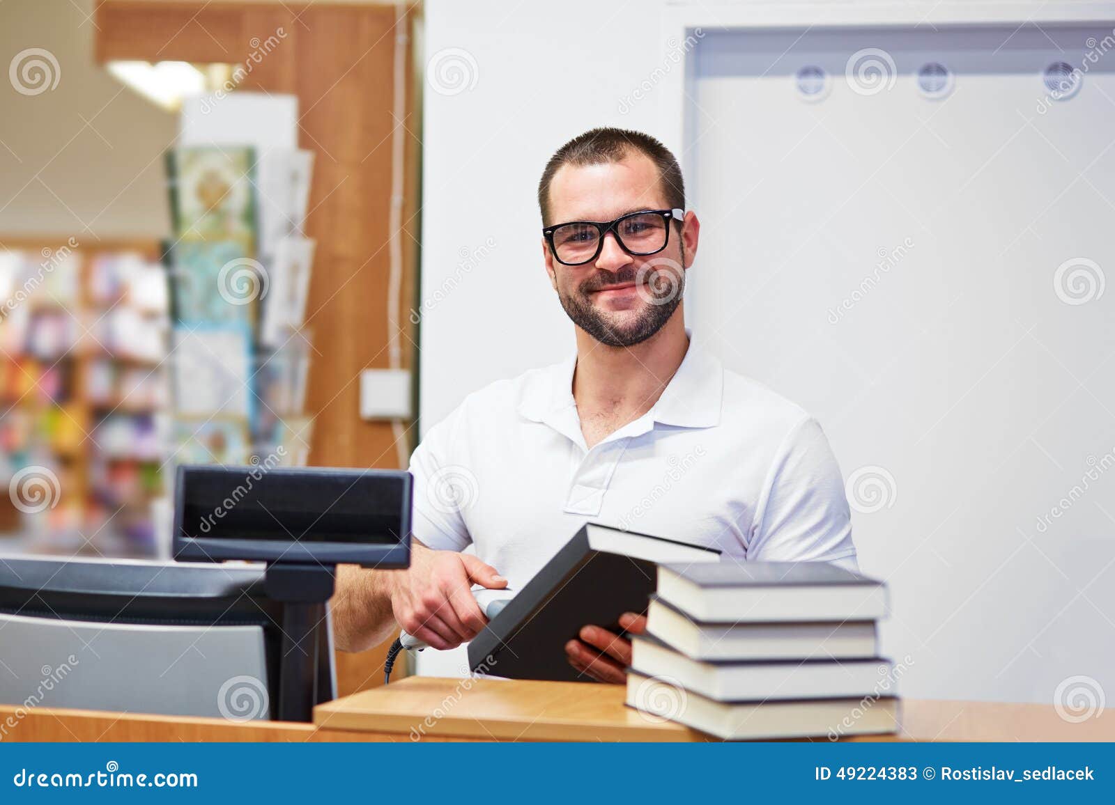 Salesman at the Checkout in a Bookstore Stock Image - Image of counter ...