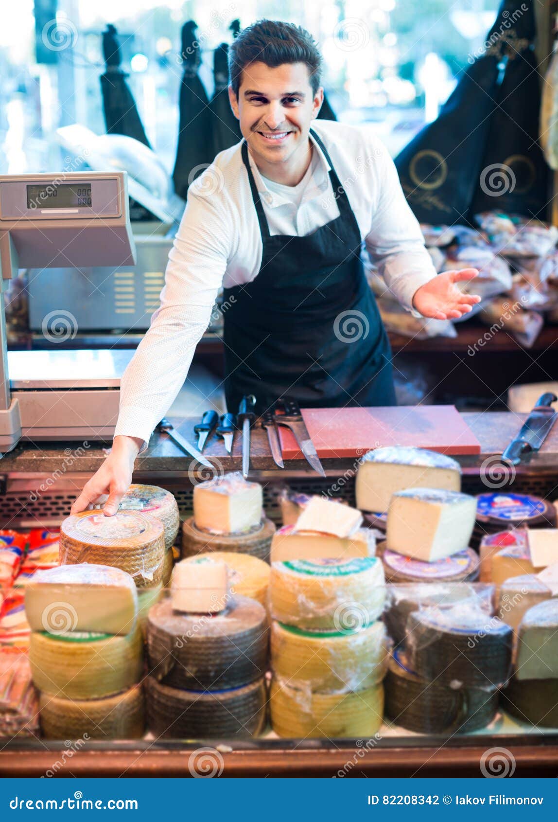 Salesman with Cheese in Gastronomy Stock Photo - Image of display ...