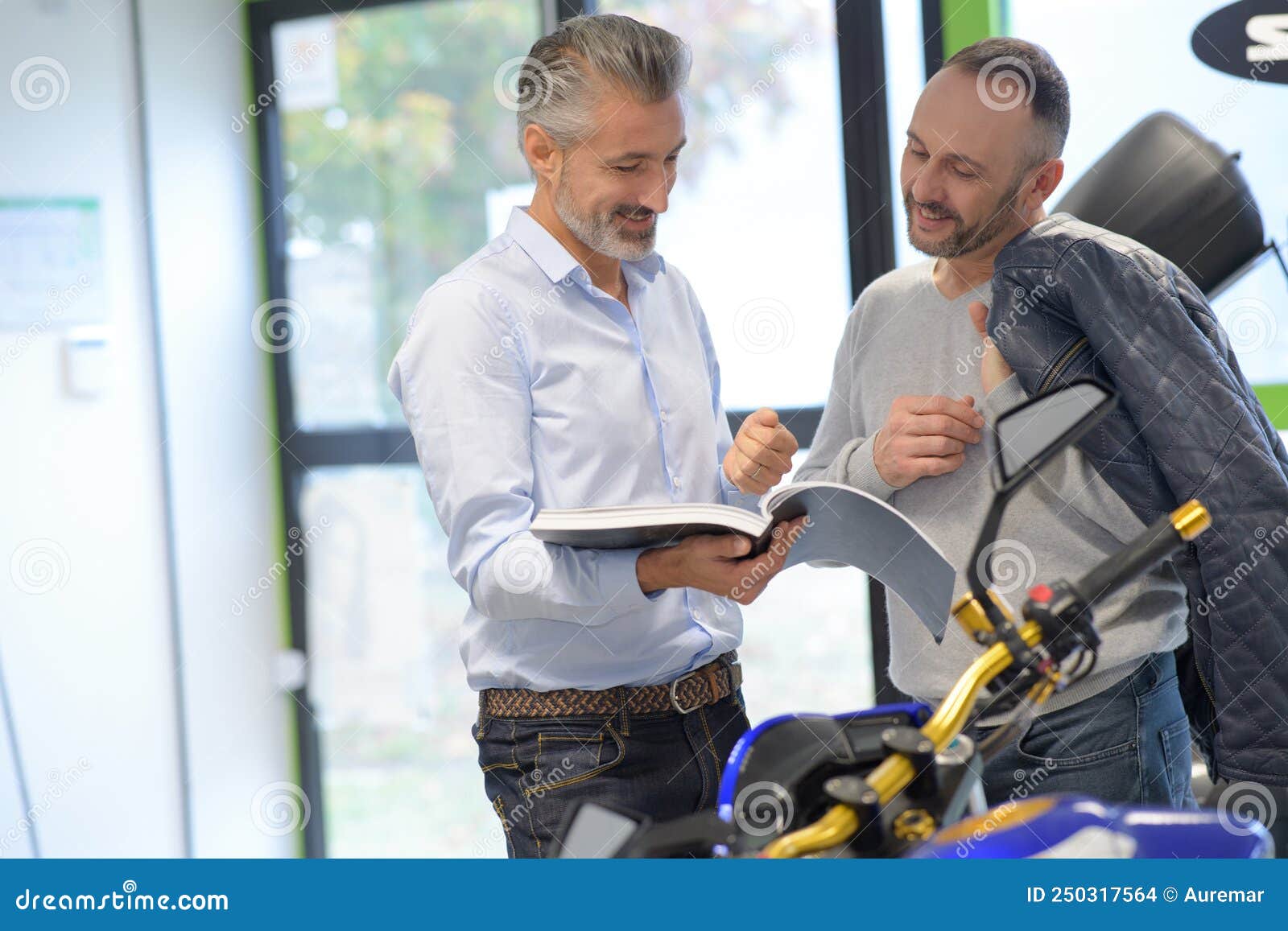 Salesman with Client in Bike Shop Stock Photo - Image of used, aged ...