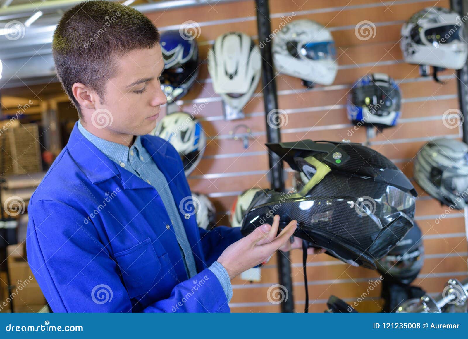 Salesman Holding Crash Helmet Stock Photo - Image of face, salesman ...