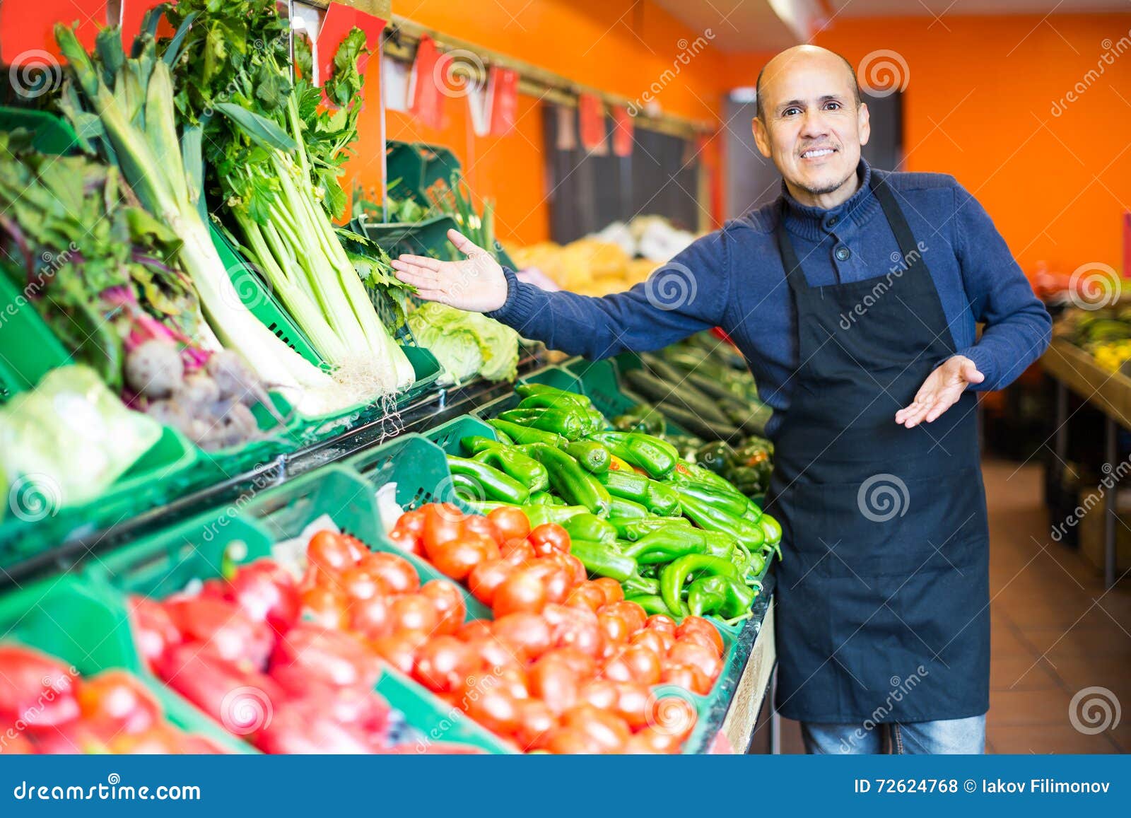 Salesman Posing Near Different Vegetables Stock Photo - Image of ...