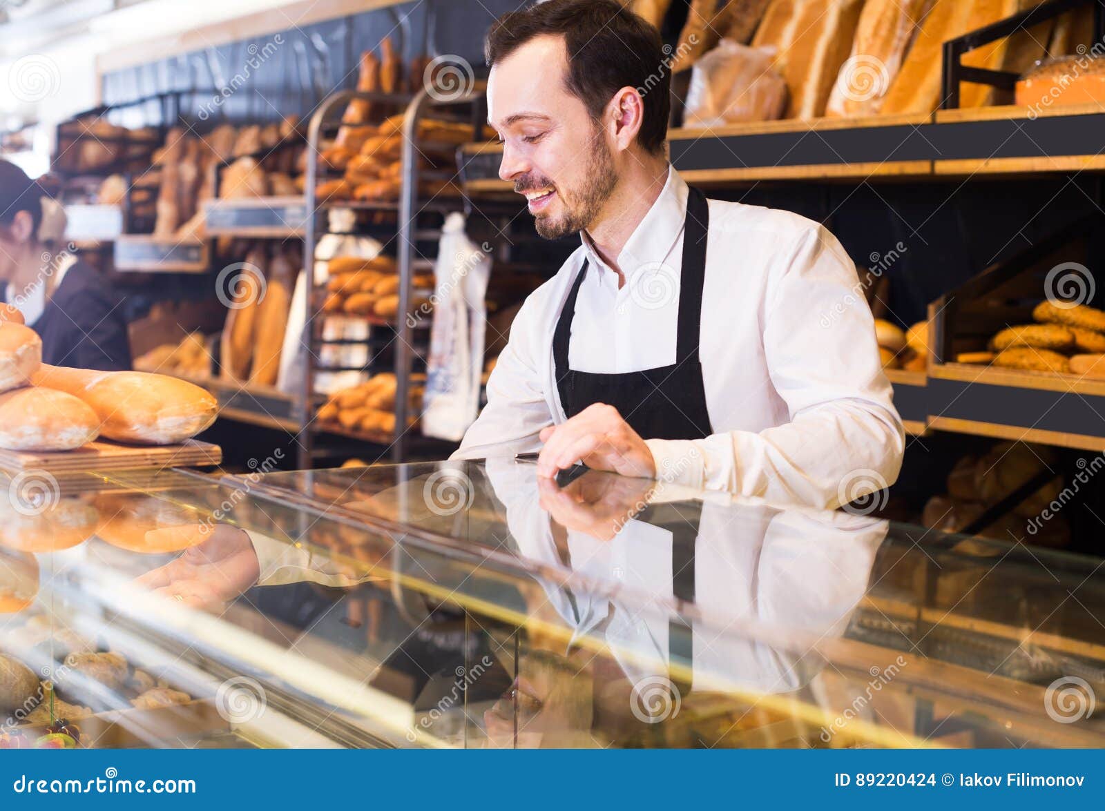 Salesman Shows Bakery Pastries Stock Photo - Image of food, dessert ...