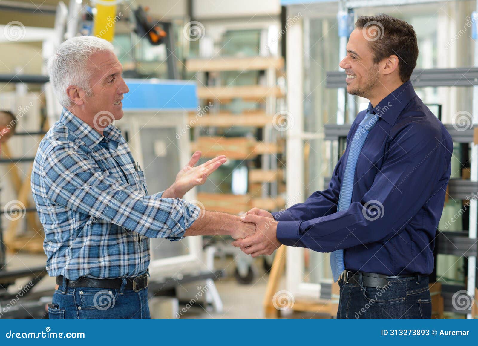 Salesman and Worker Shaking Hands in Factory Stock Image - Image of ...