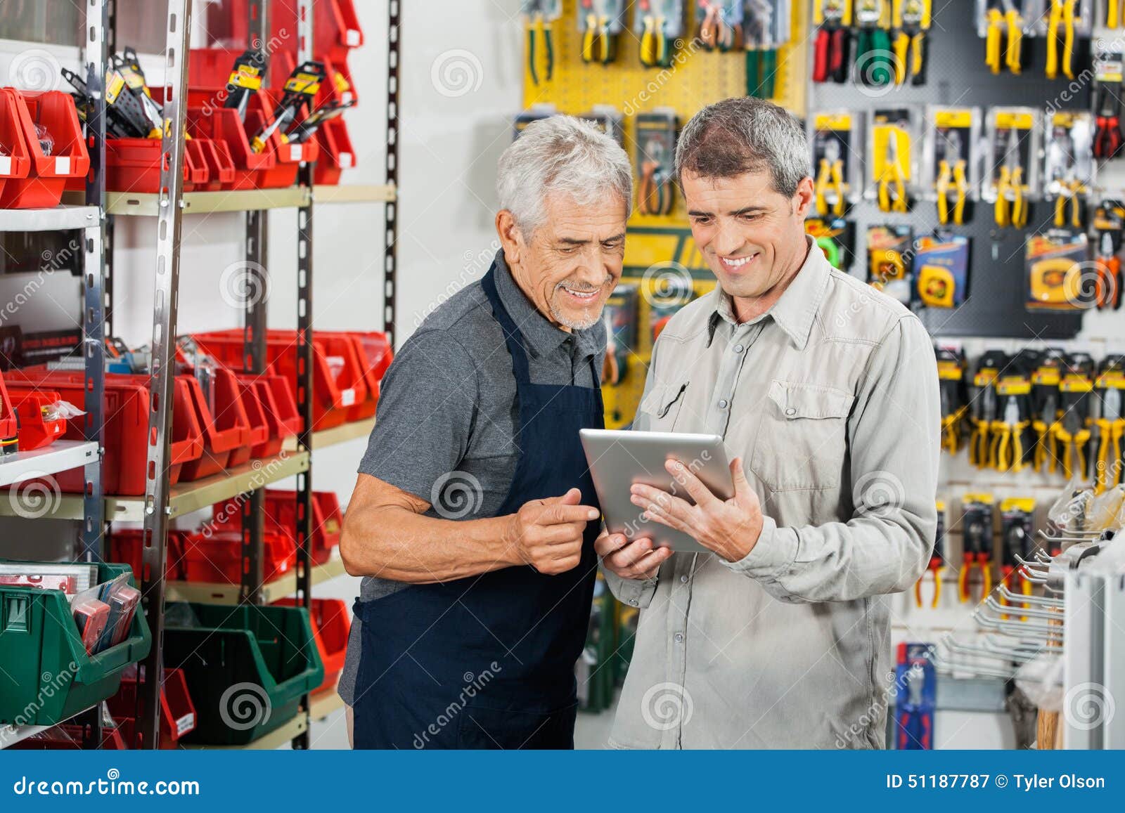 Salesperson and Customer Using Tablet Computer Stock Image - Image of ...
