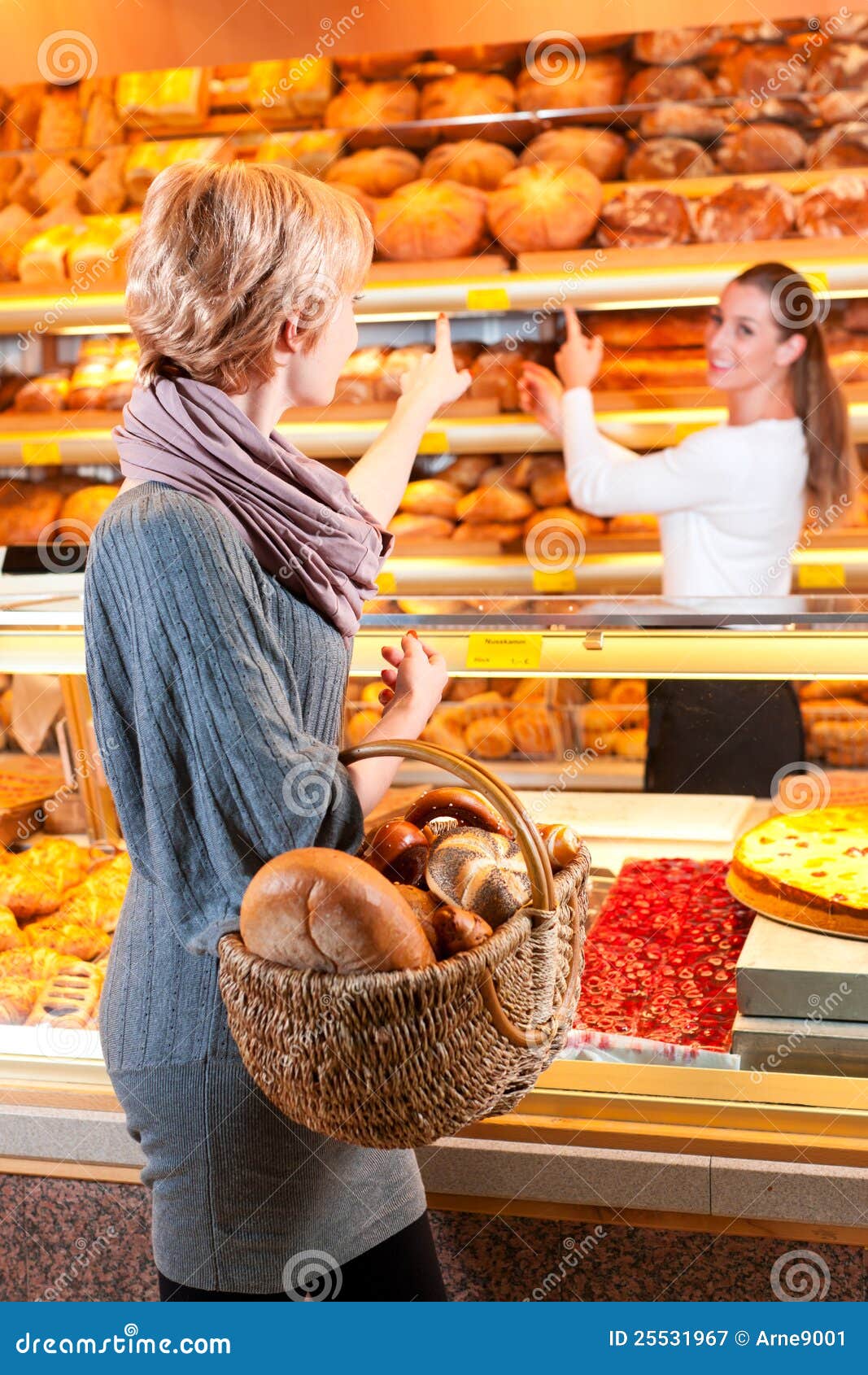 Salesperson with Female Customer in Bakery Stock Image - Image of ...