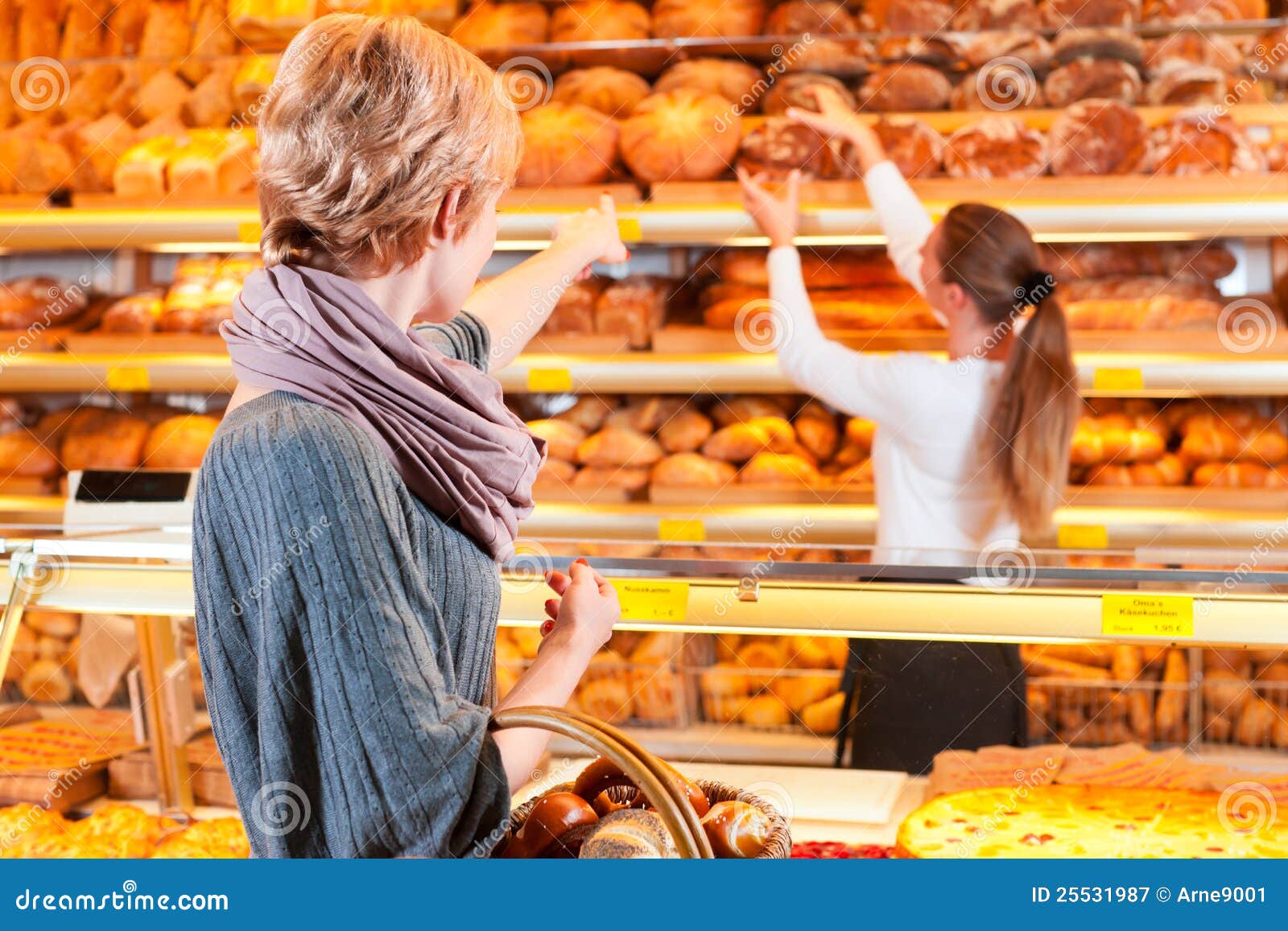 Salesperson with Female Customer in Bakery Stock Image - Image of ...