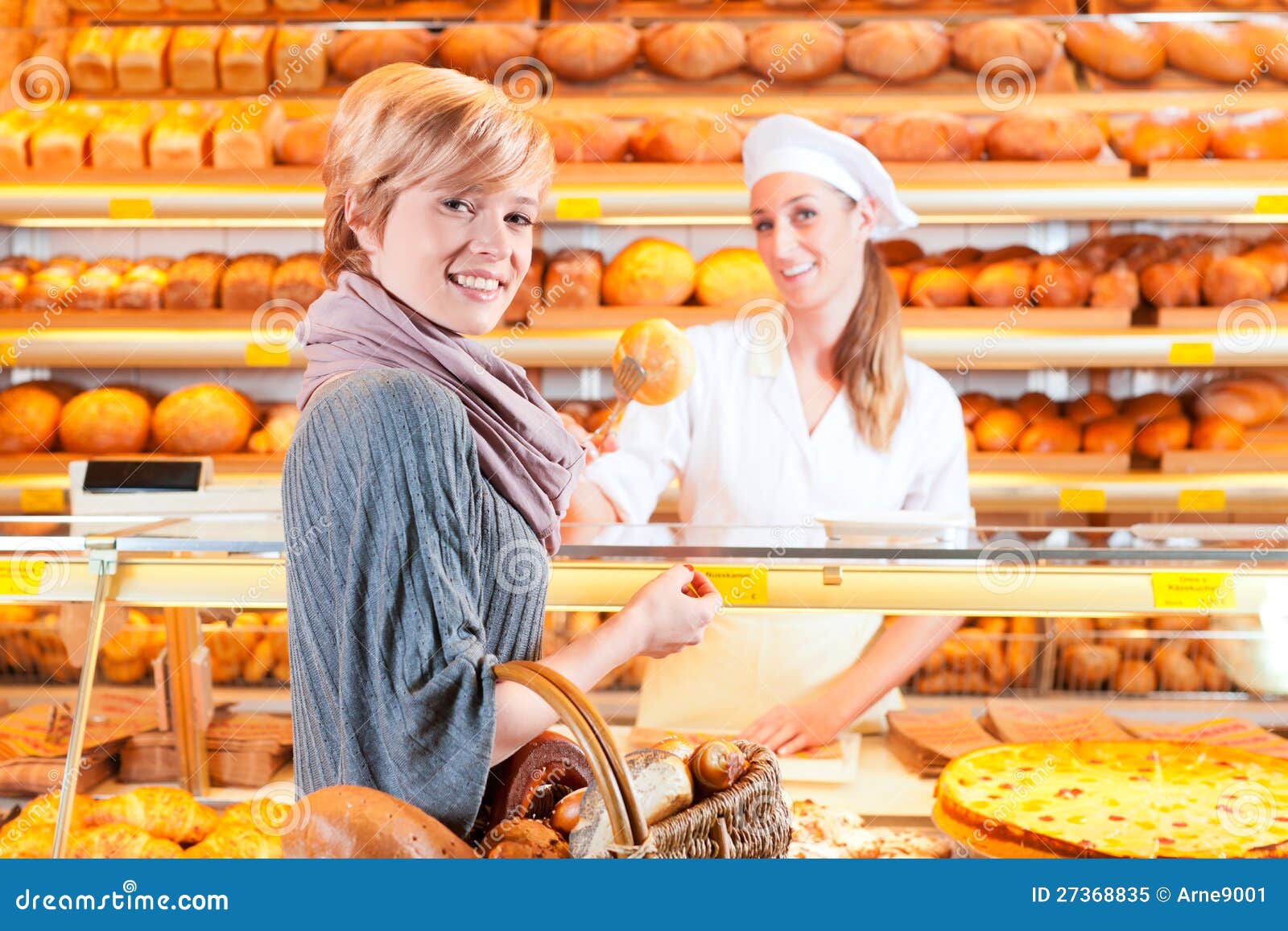 Salesperson with Female Customer in Bakery Stock Image - Image of ...