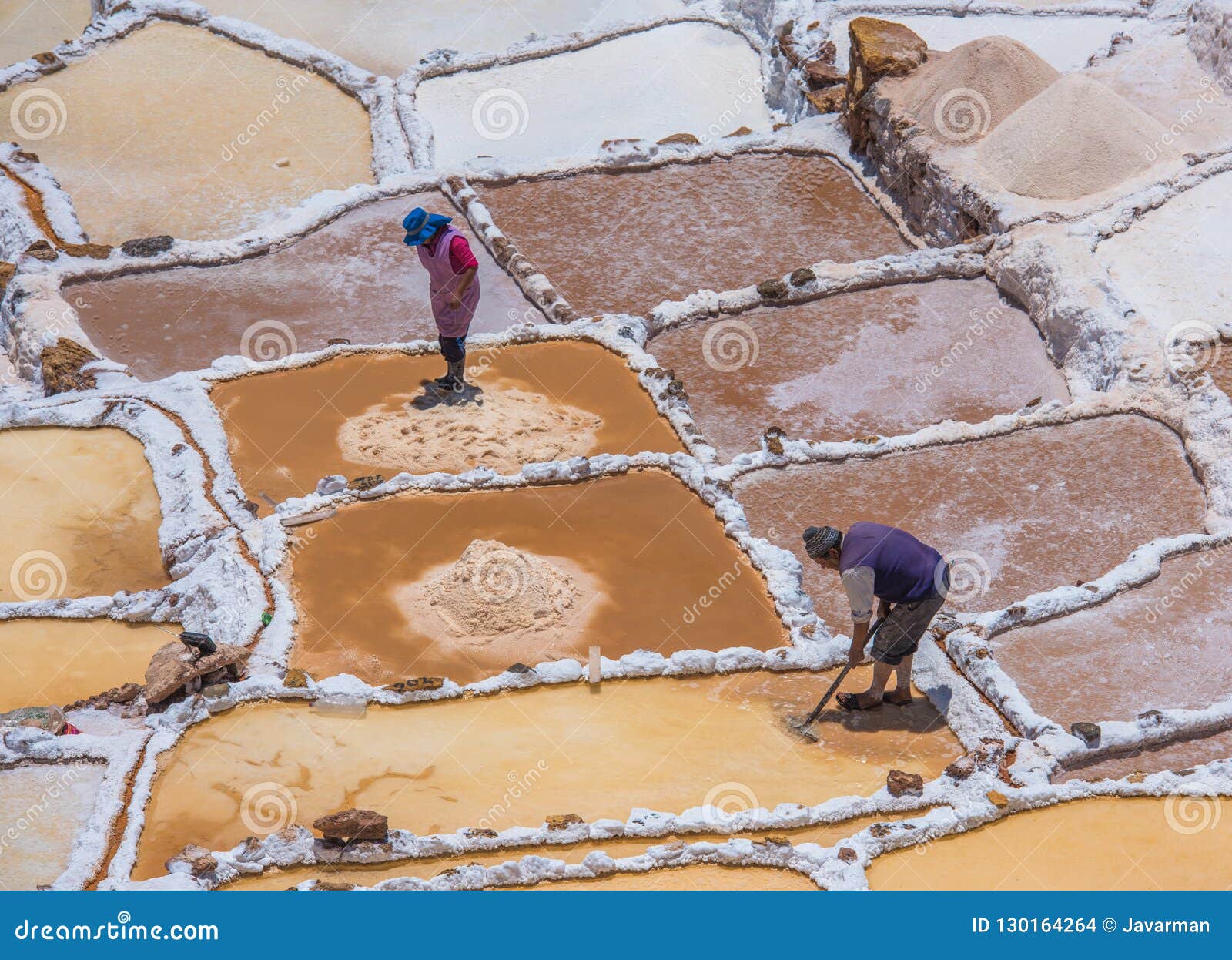 SALINAS DE MARAS, PERU: Workers Extracting Salt at Salinas De Maras ...