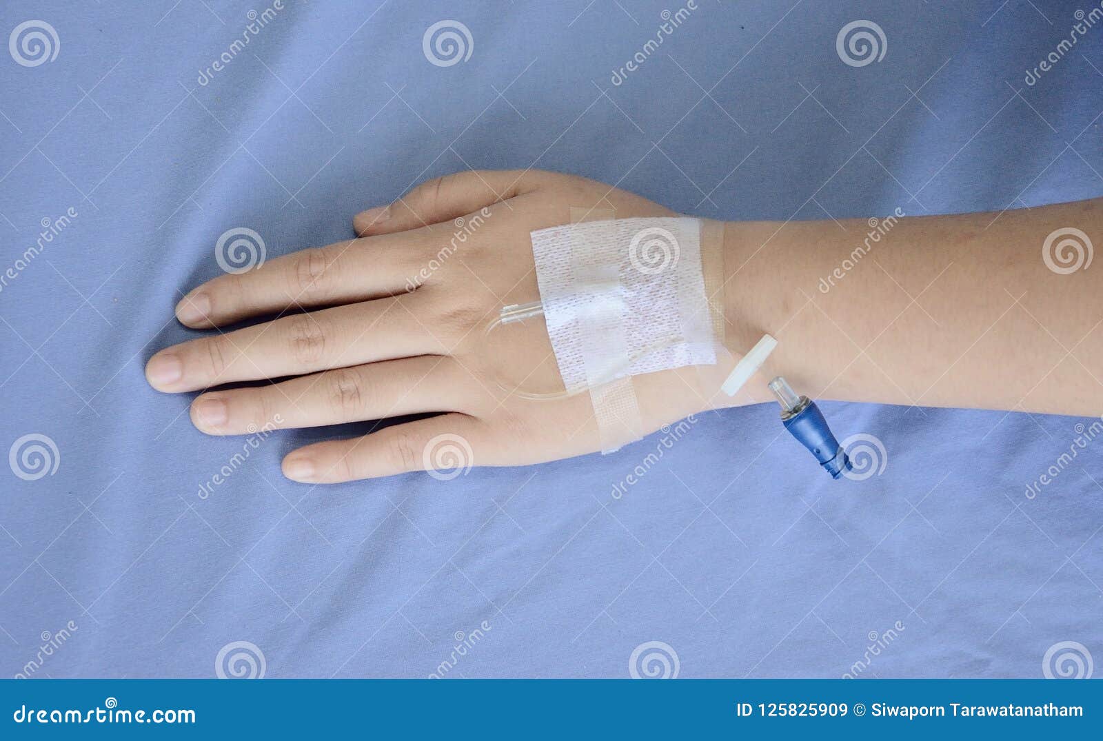 Saline Solution in Close Up View with Patient in Background Stock Image ...