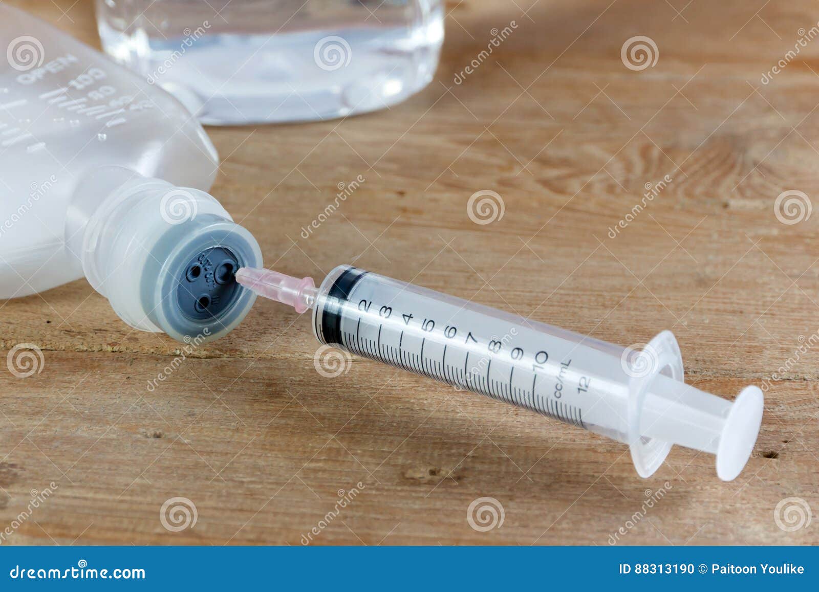 Saline Solution and Injection Needle Stock Photo - Image of medicament ...
