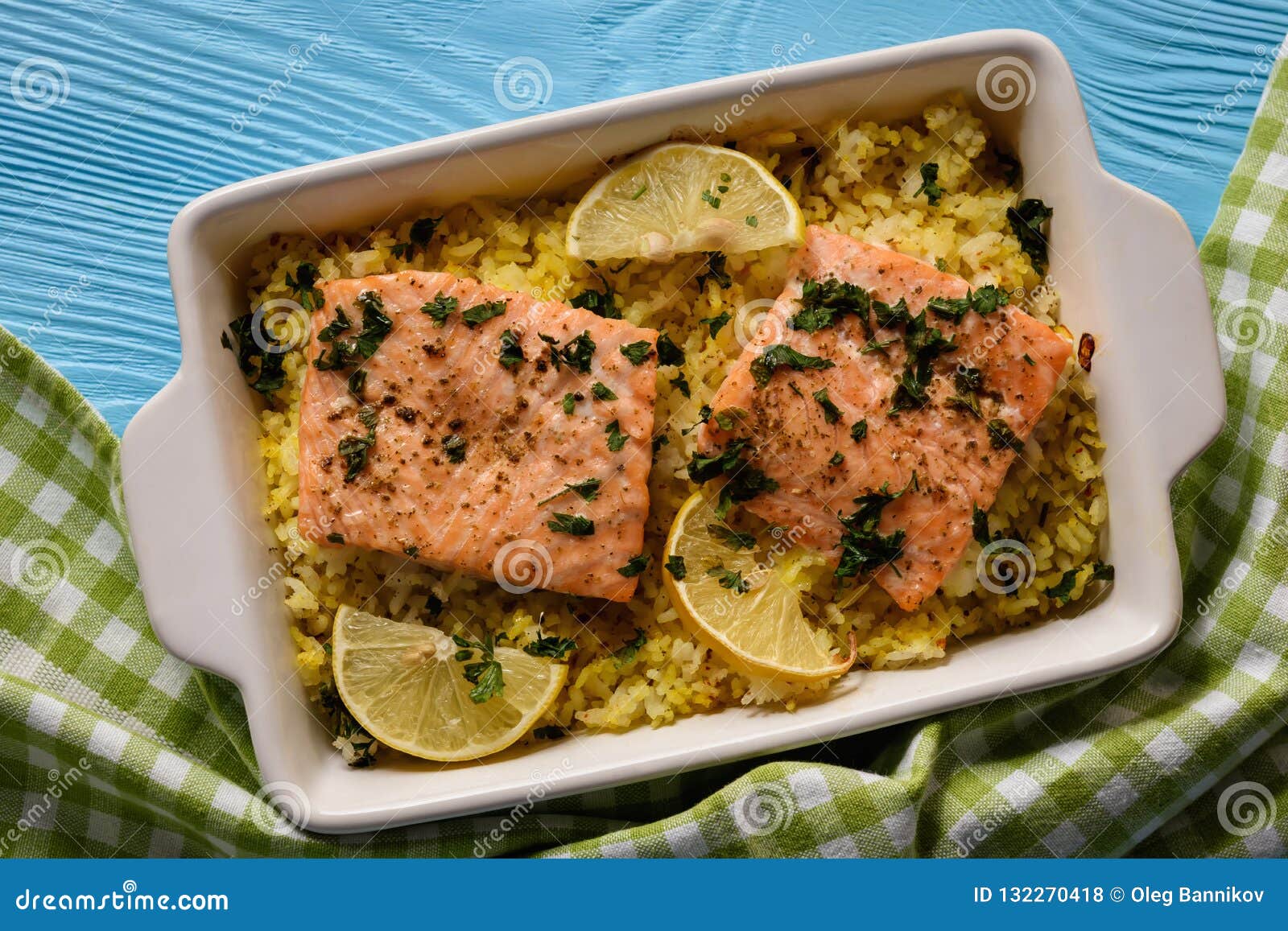 Salmon Baked on Oven with Rice and Lemon. Stock Photo - Image of ...