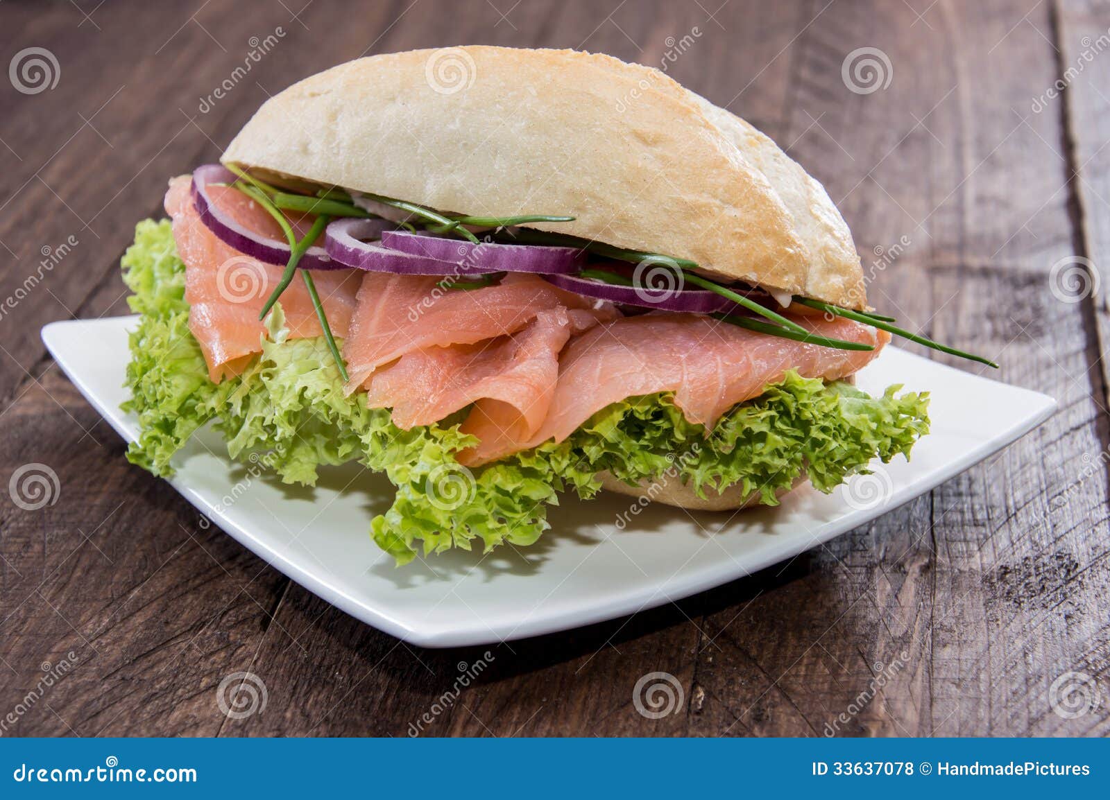 Salmon Bun on a plate stock photo. Image of tasty, baguette - 33637078