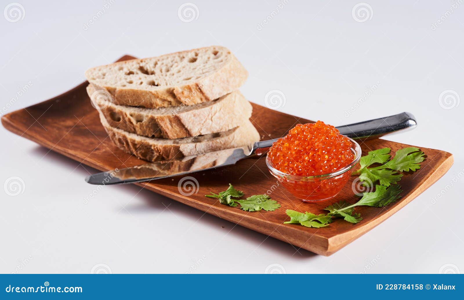 Salmon roe on bread stock photo. Image of gourmet, seafood - 228784158