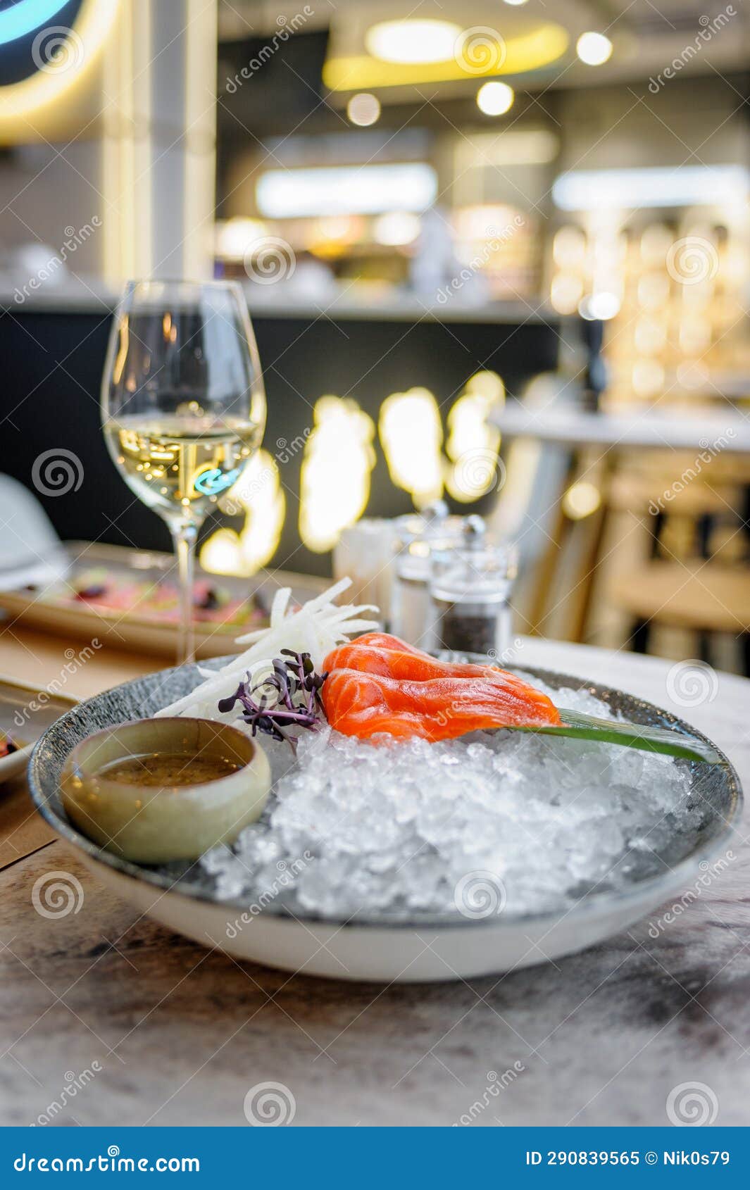Salmon Sashimi Plate with Sauce and Ice on a Marble Table Stock Image ...