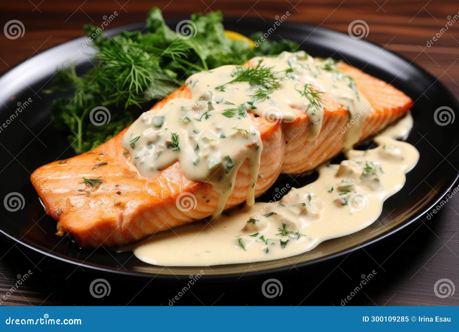Salmon with sauce on plate stock image. Image of herbs - 300109285