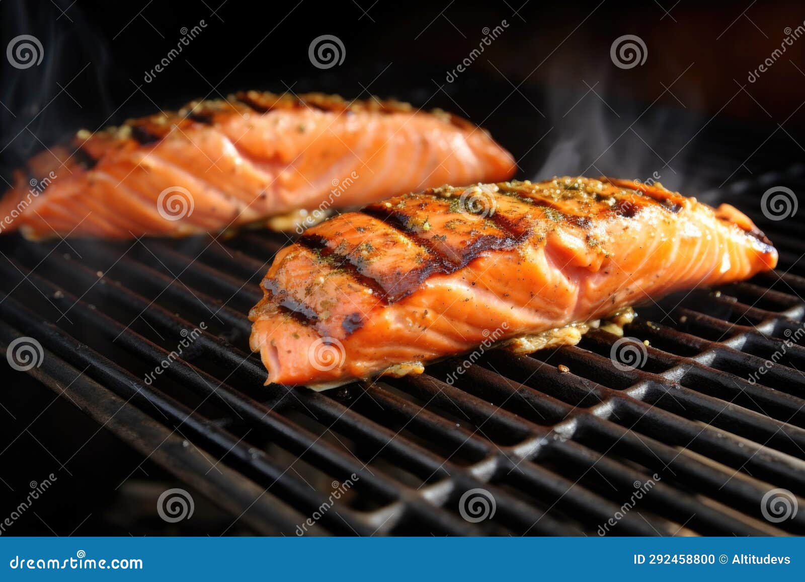 Salmon Steaks on a Grill Rack with Smoke Rising Stock Photo - Image of ...