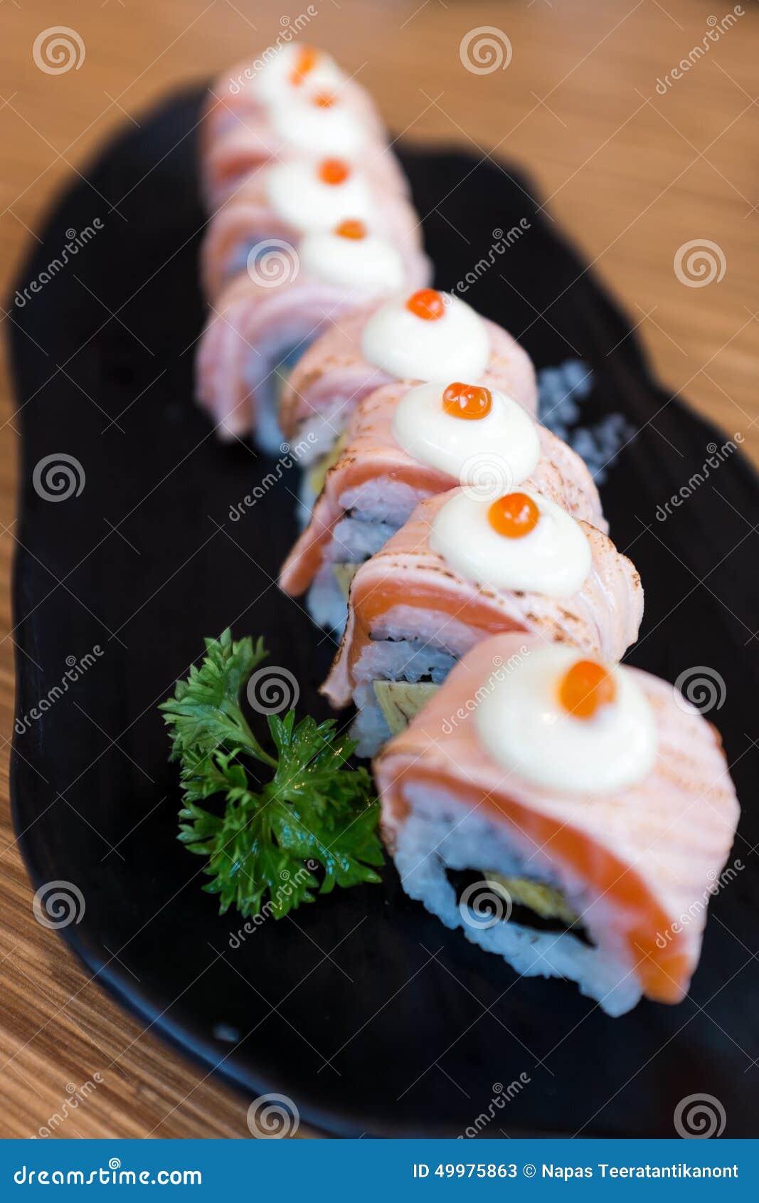 Salmon sushi rolls stock image. Image of exotic, traditional - 49975863