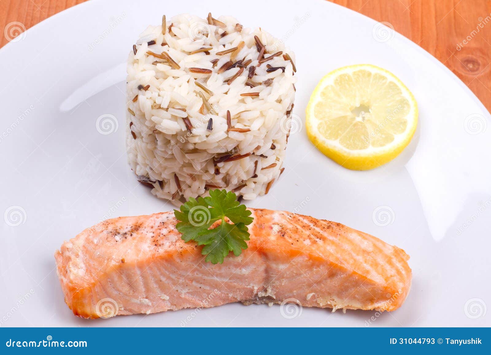 Salmon with wild rice stock image. Image of wooden, lemon - 31044793