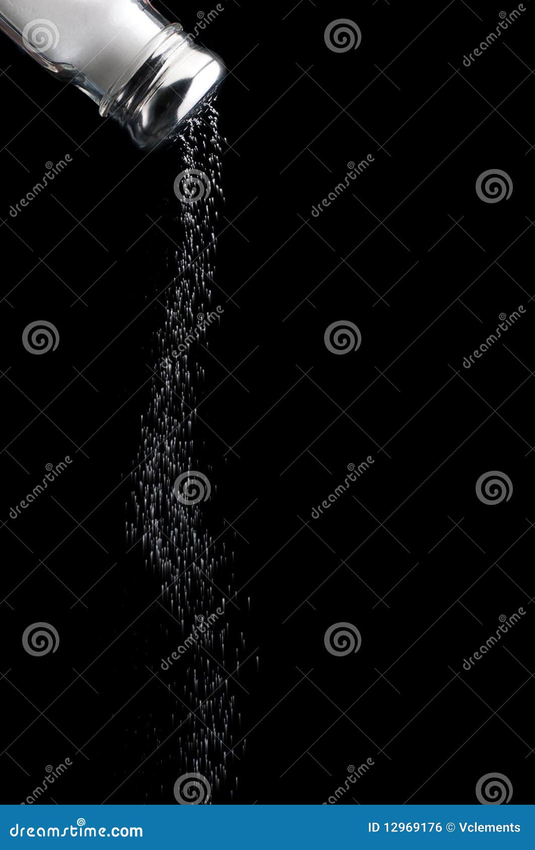 Salt Being Poured from a Salt Shaker Stock Photo - Image of shaker ...