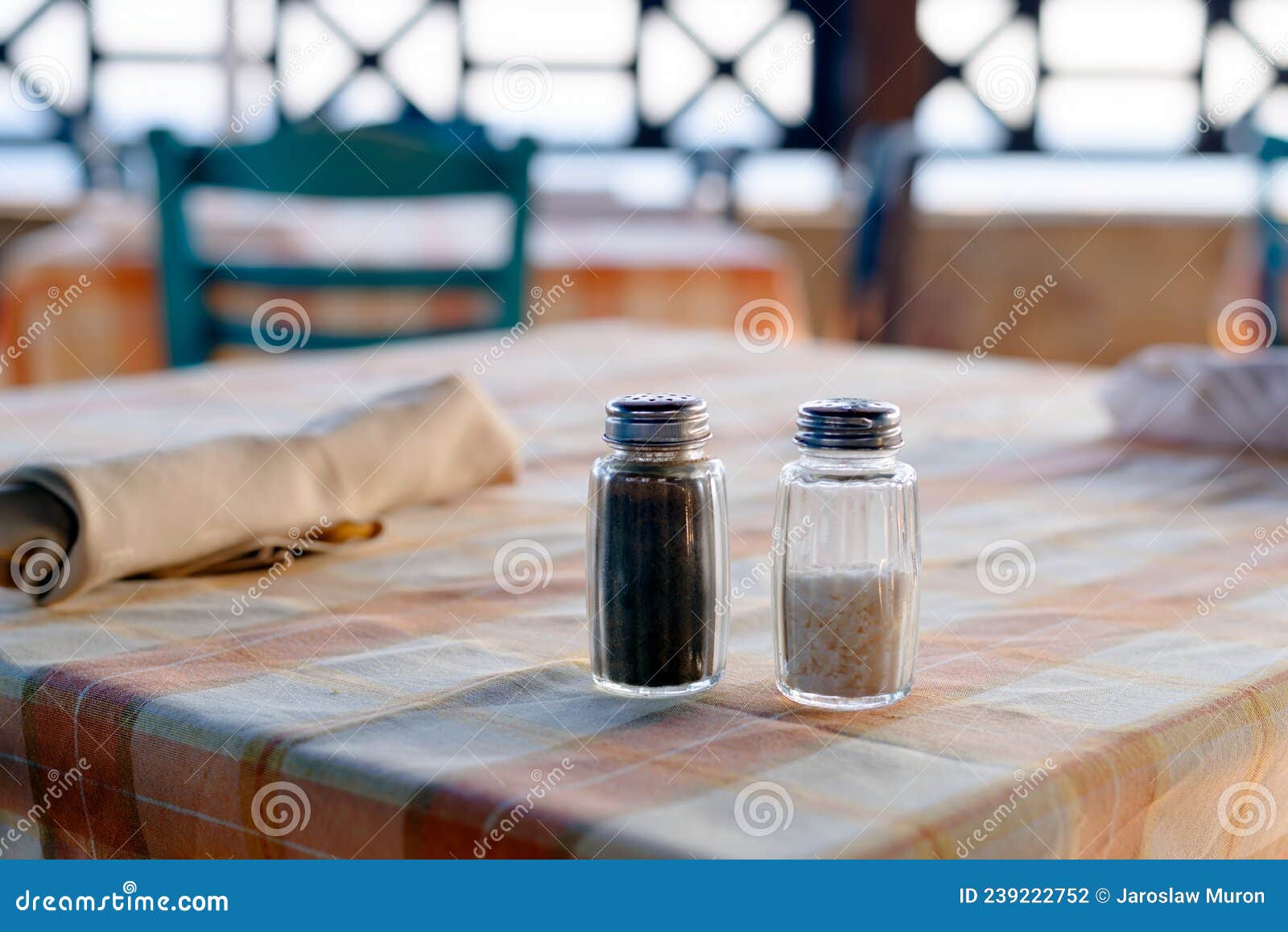 Salt and Black Pepper on the Table in Greek Taverna Stock Photo - Image ...