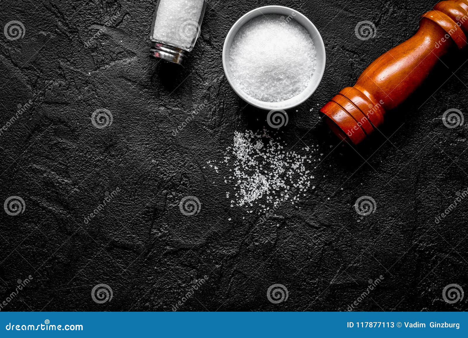 Salt and Saltcellar on Black Stone Table Background Top View Moc Stock ...
