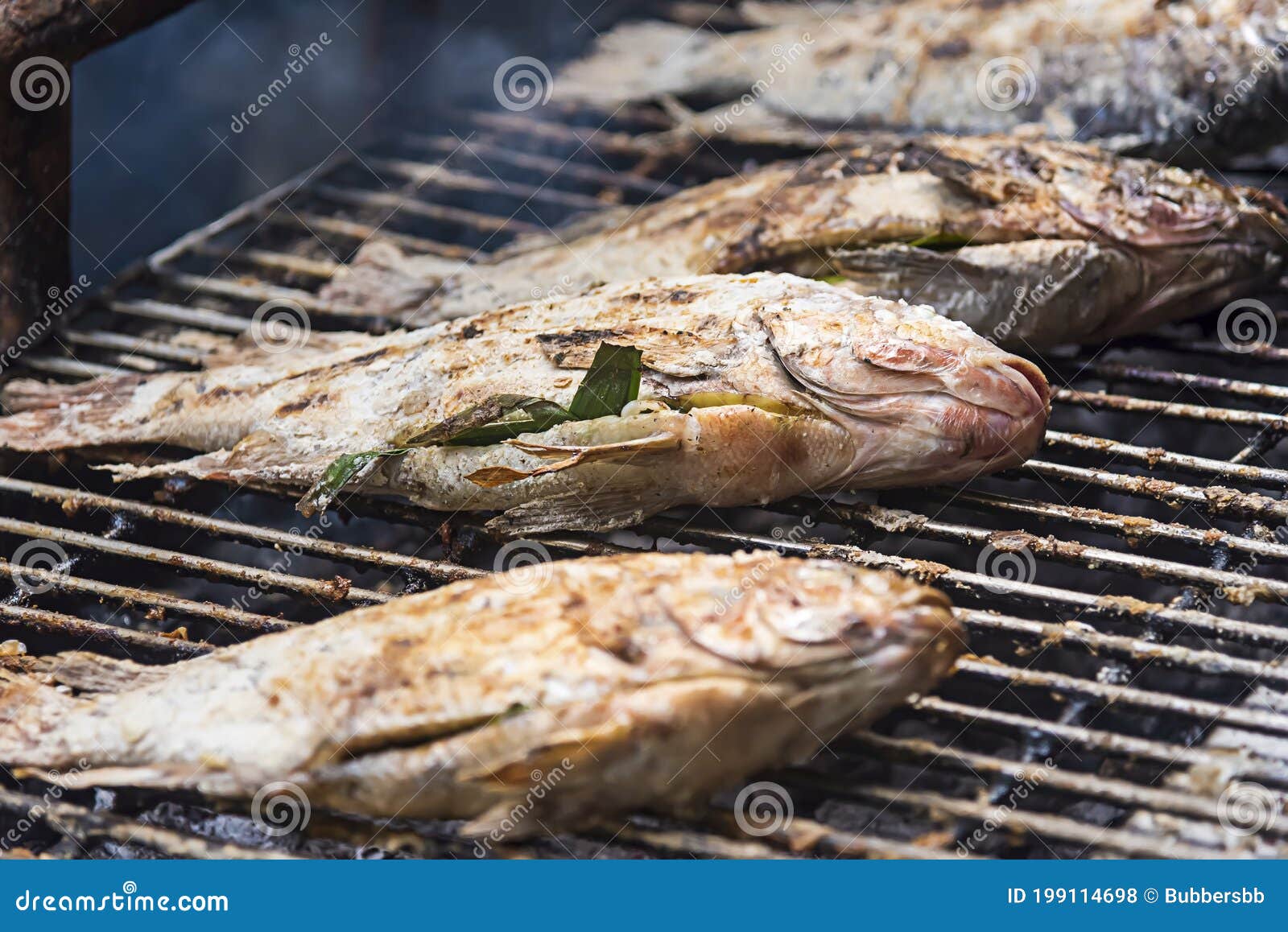 Salt Grilled Fish on the Coals is a Traditional Thai Dishish Stock ...