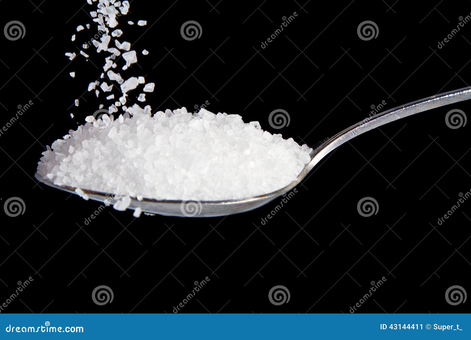 Salt on a metal spoon stock image. Image of flavor, spoon - 43144411