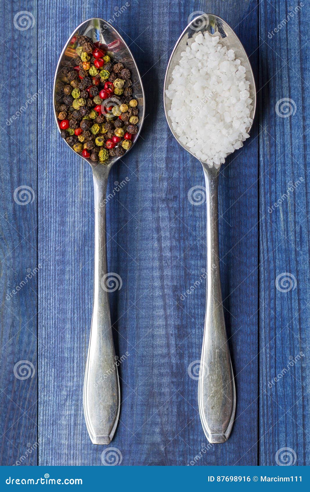 Salt and Pepper on Metal Spoons Stock Photo - Image of powder, brown ...
