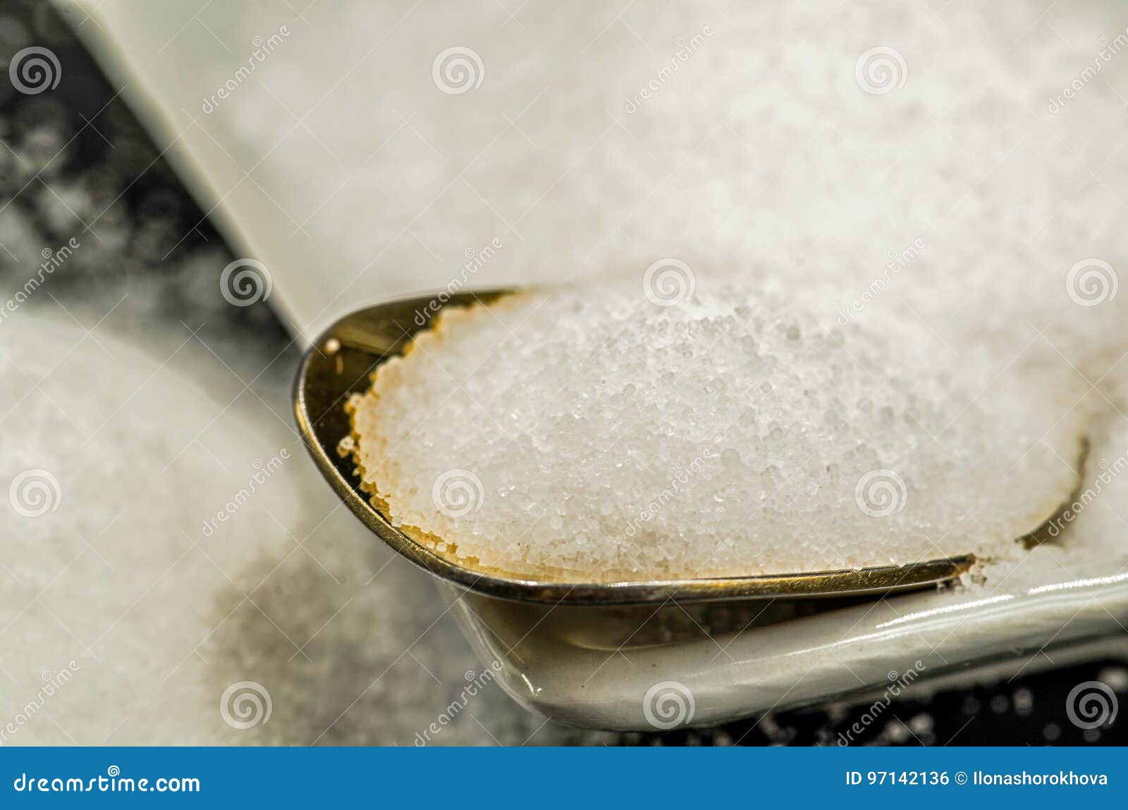 Salt in a Rectangular Plate on Black with a Spoon Stock Photo - Image ...
