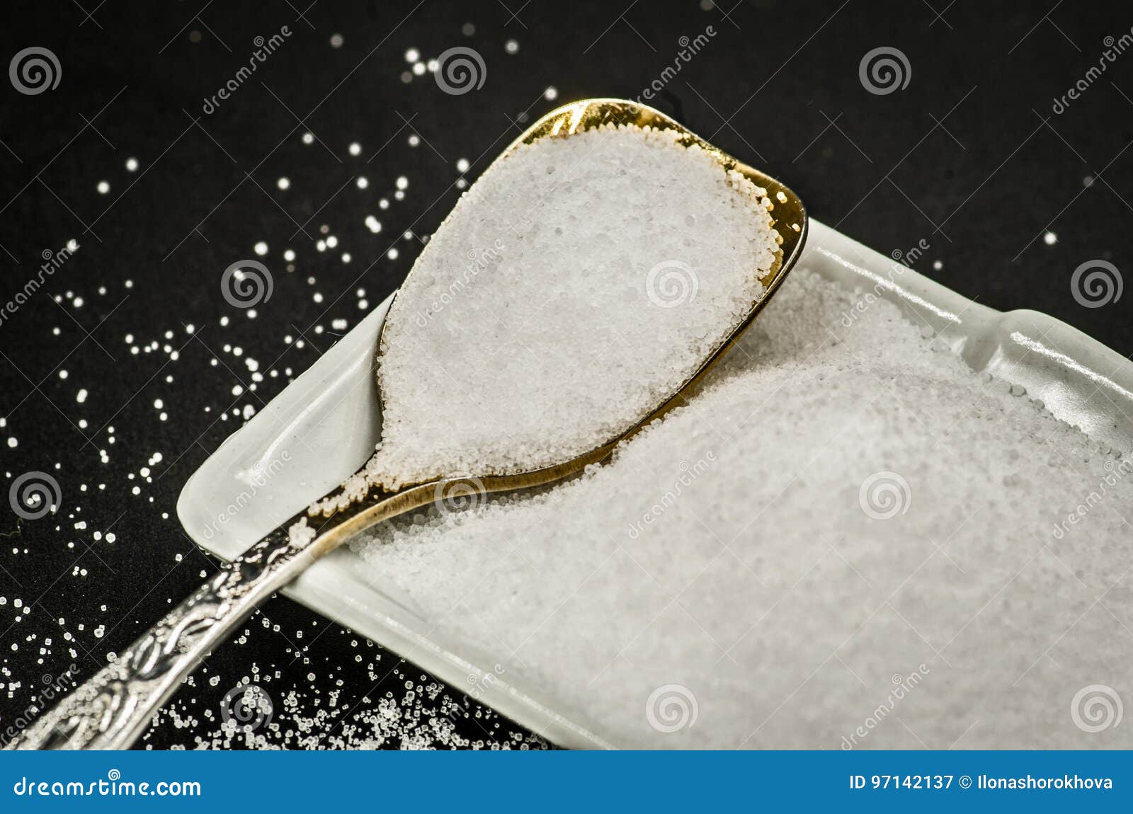 Salt in a Rectangular Plate on Black with a Spoon Stock Image - Image ...