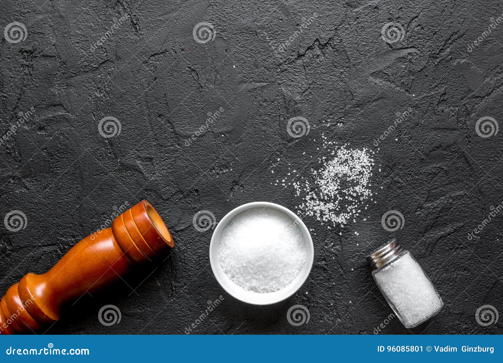 Salt and Saltcellar on Black Stone Table Background Top View Mock-up ...