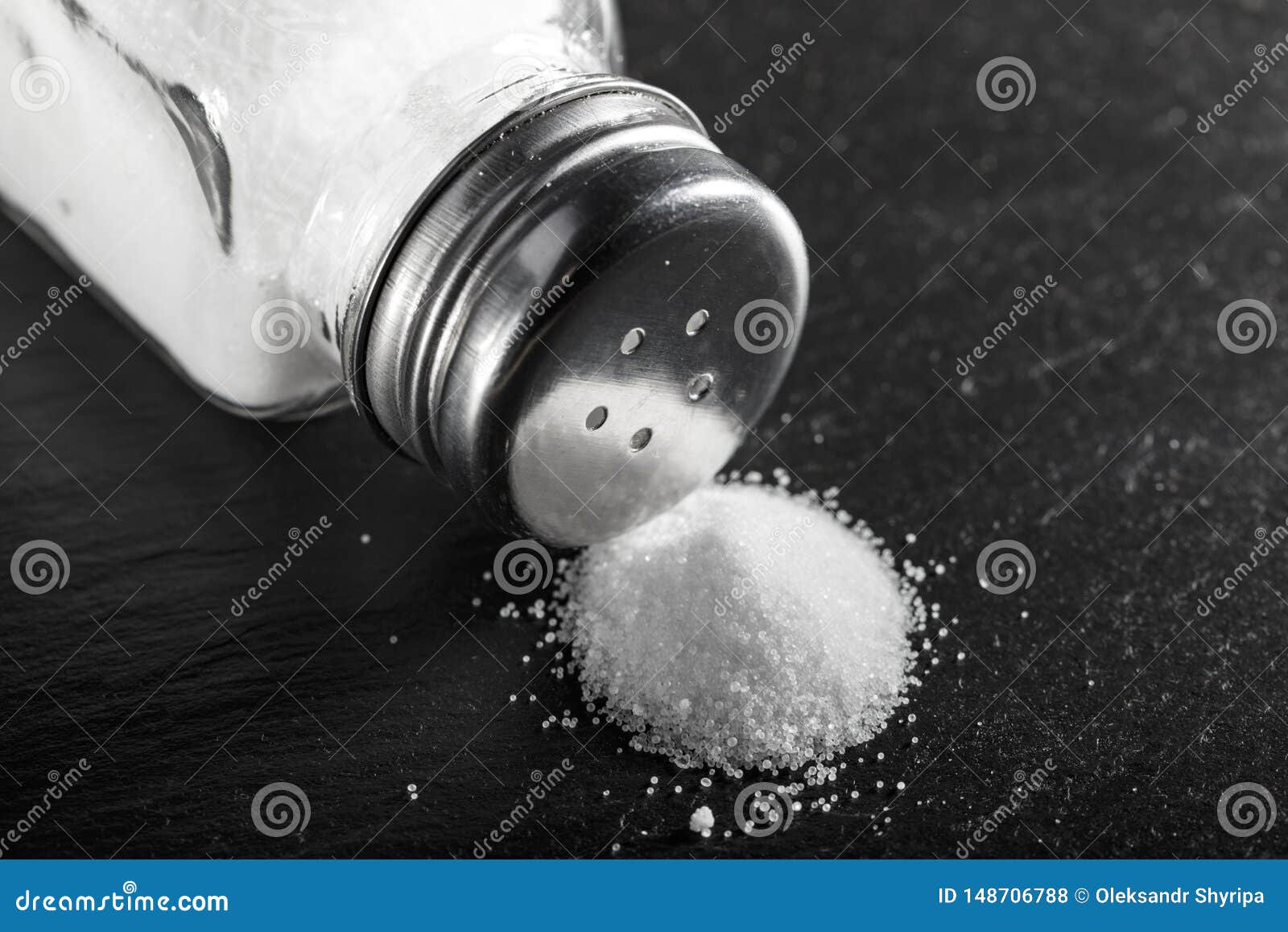 Salt Scattered from the Salt Shaker Stock Photo - Image of container ...