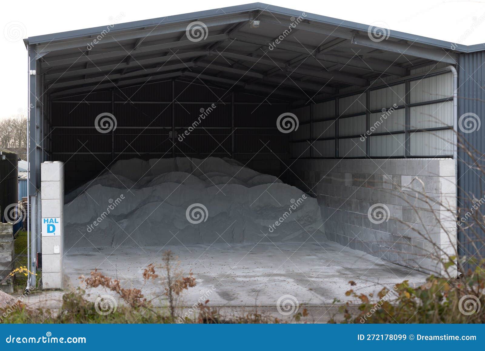 Salt Storage Shed with a Large Pile of Salt. Stock Image - Image of ...