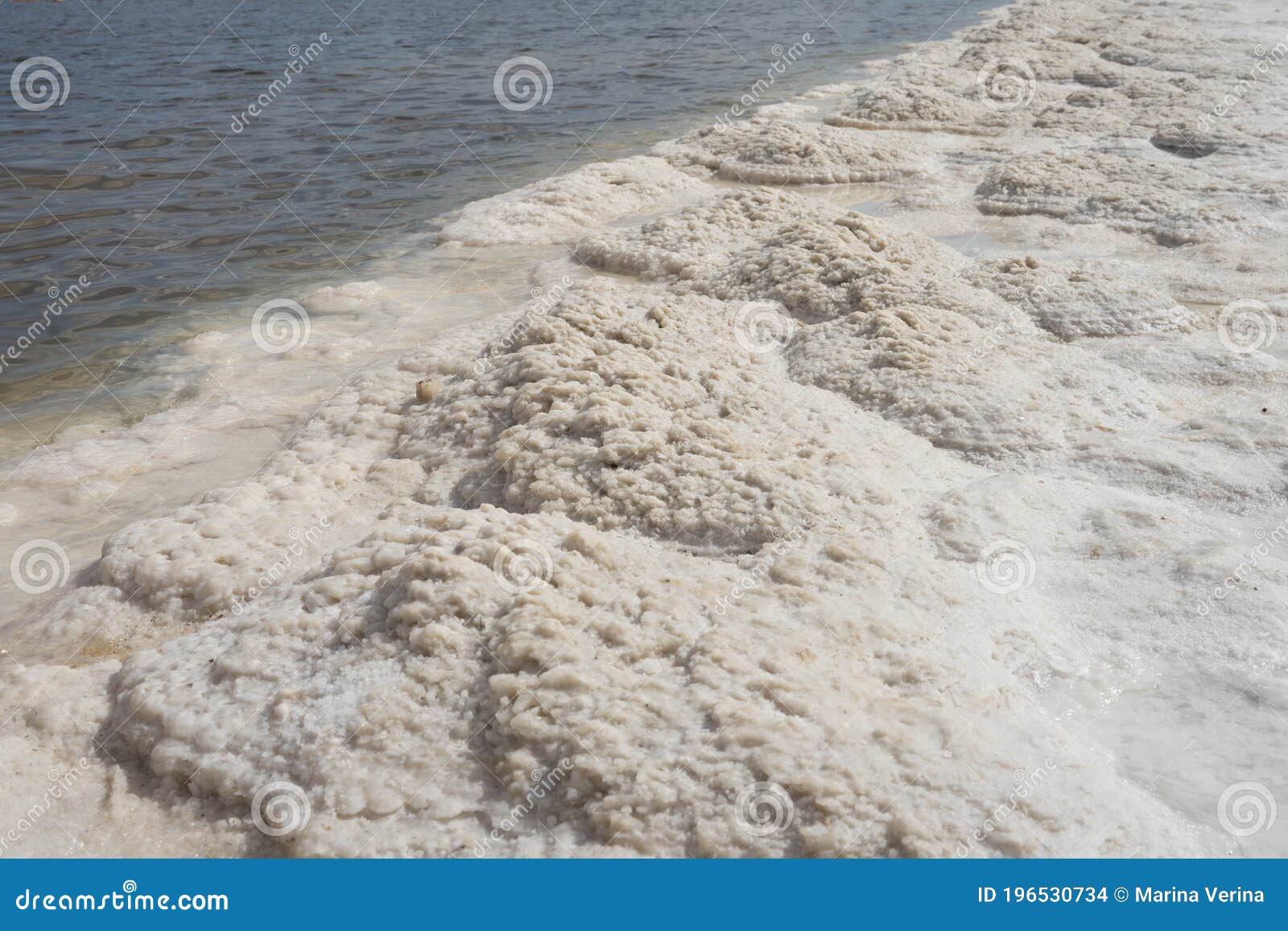 Salt on a white salt lake stock photo. Image of blue - 196530734